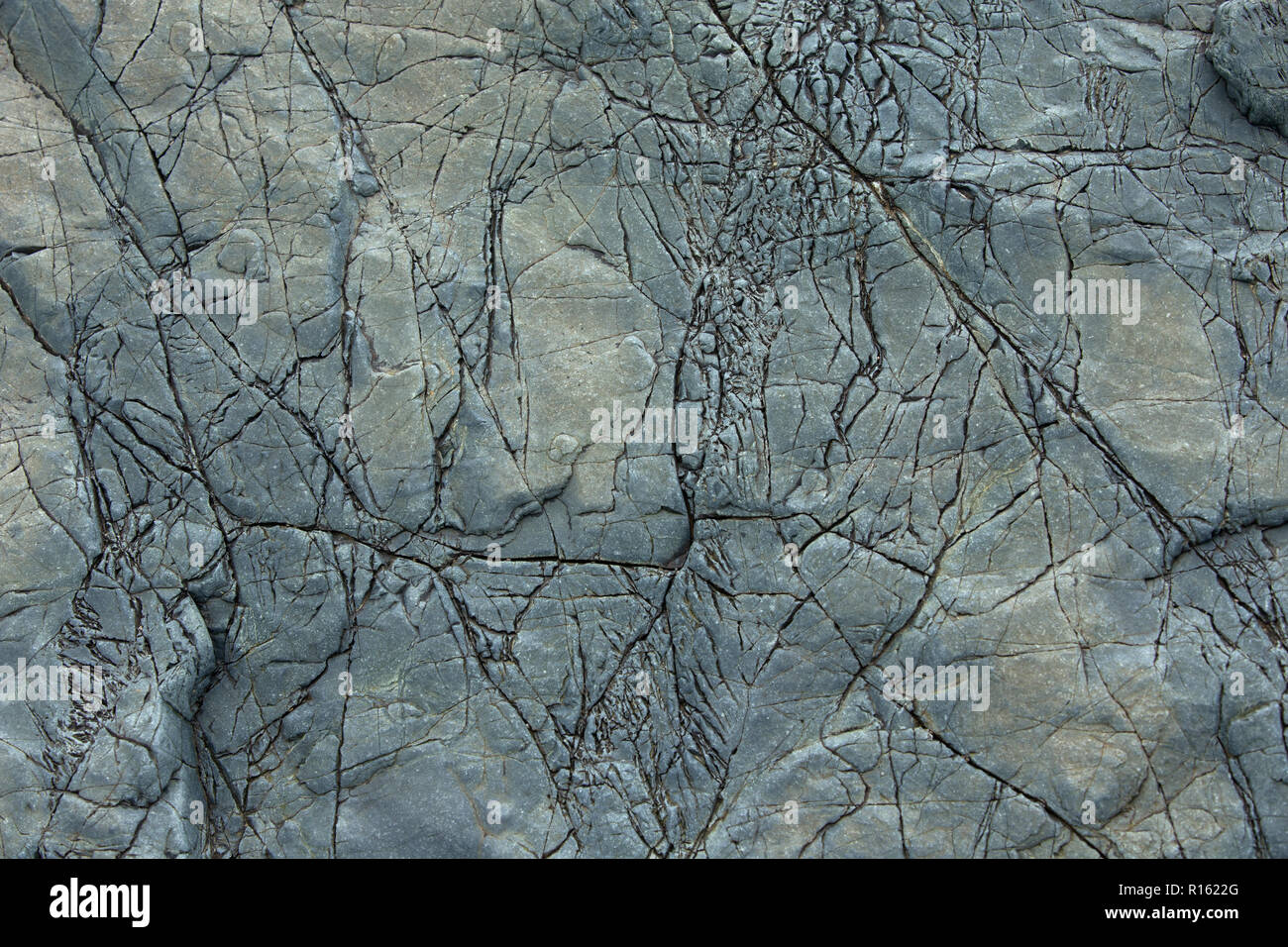 Natural stone background with cracks. Close up view Stock Photo - Alamy