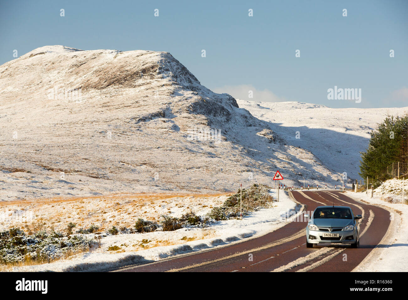 The Fannichs covered in fresh snow near Ullapool, Scotland, UK from the ...
