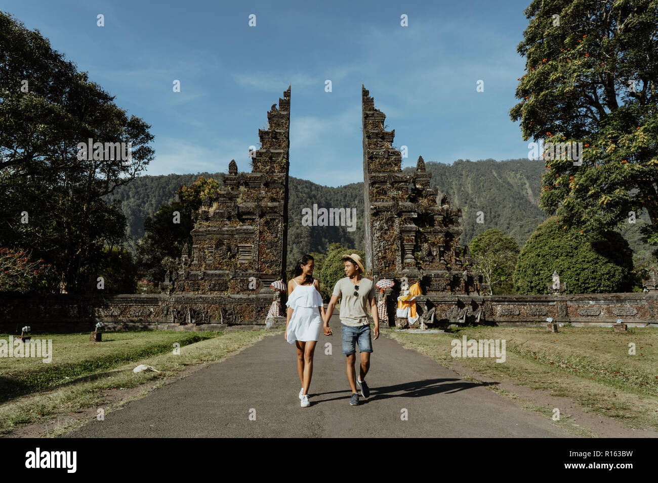 Boy walking through gate hi-res stock photography and images - Alamy