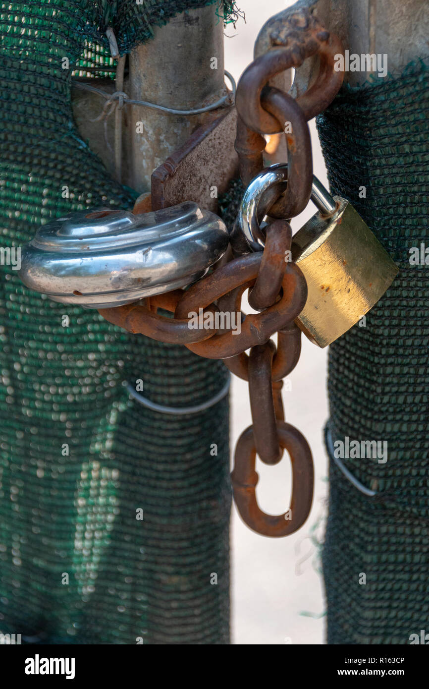 Security gate locks hi-res stock photography and images - Alamy