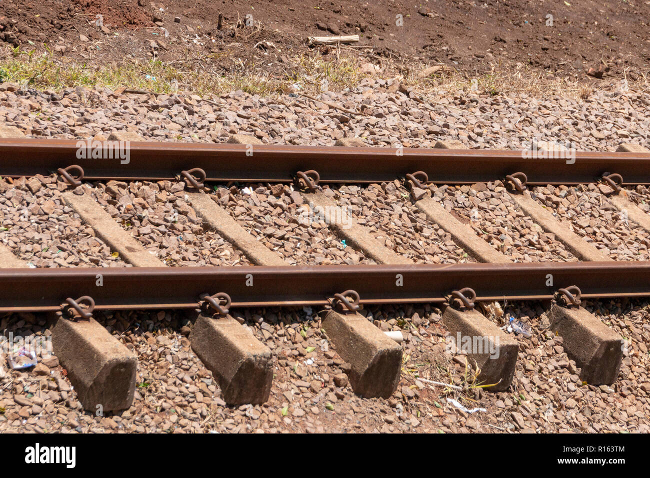 A close up view of a straight metal and concrete railway lines Stock ...