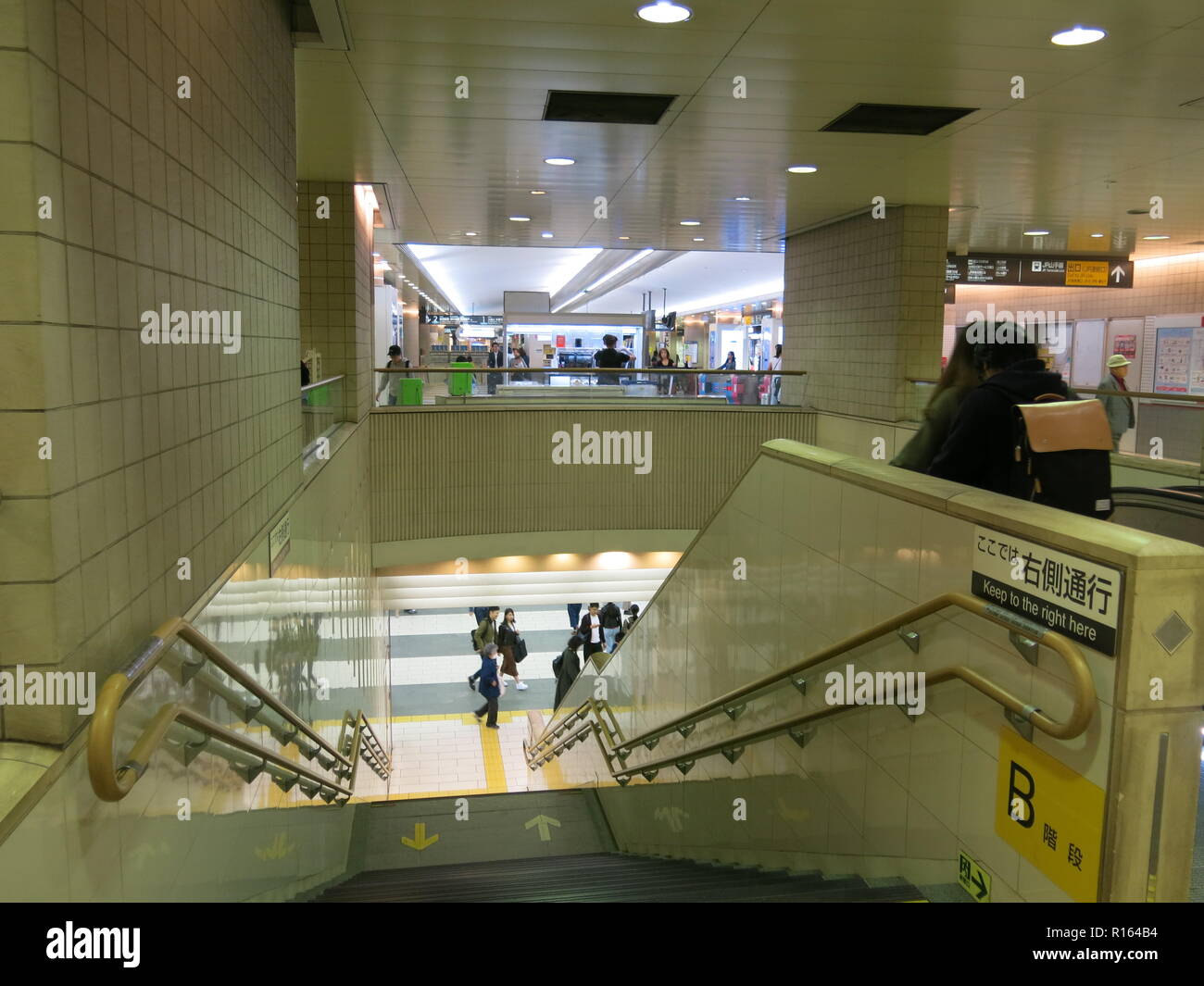 Interior of a Tokyo train station, where most of the wayfinding signs ...