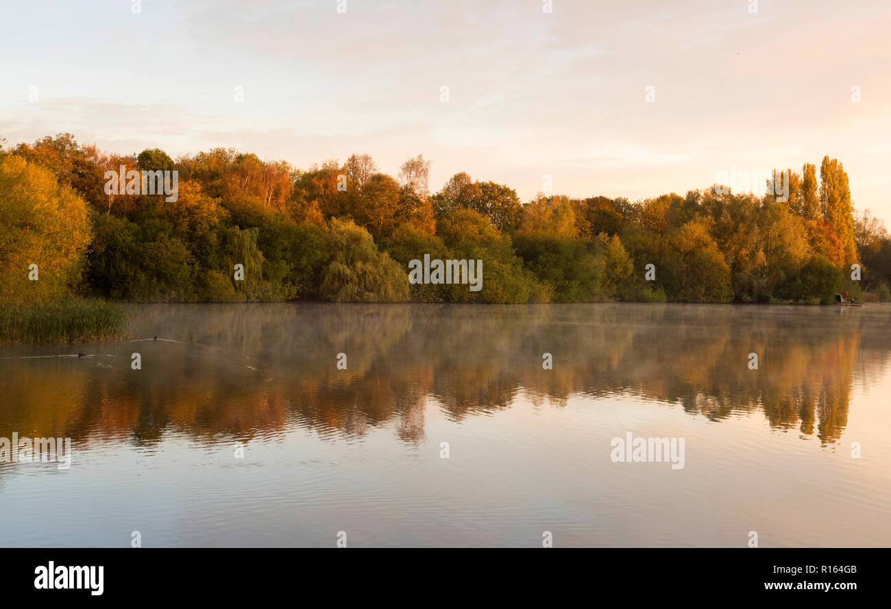 Sunrise reflections on the Lake at Colwick Country Park in Nottingham ...
