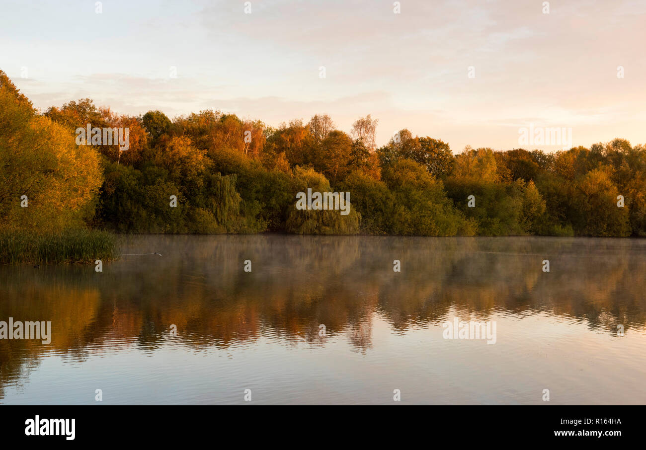 Sunrise reflections on the Lake at Colwick Country Park in Nottingham ...