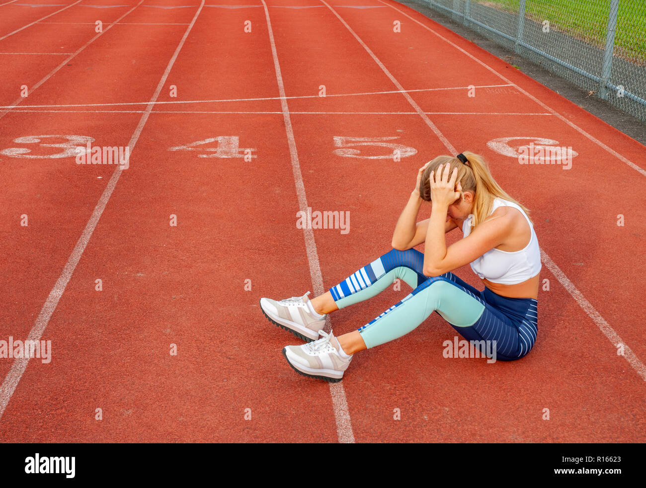 Woman competition track rest hi-res stock photography and images - Alamy