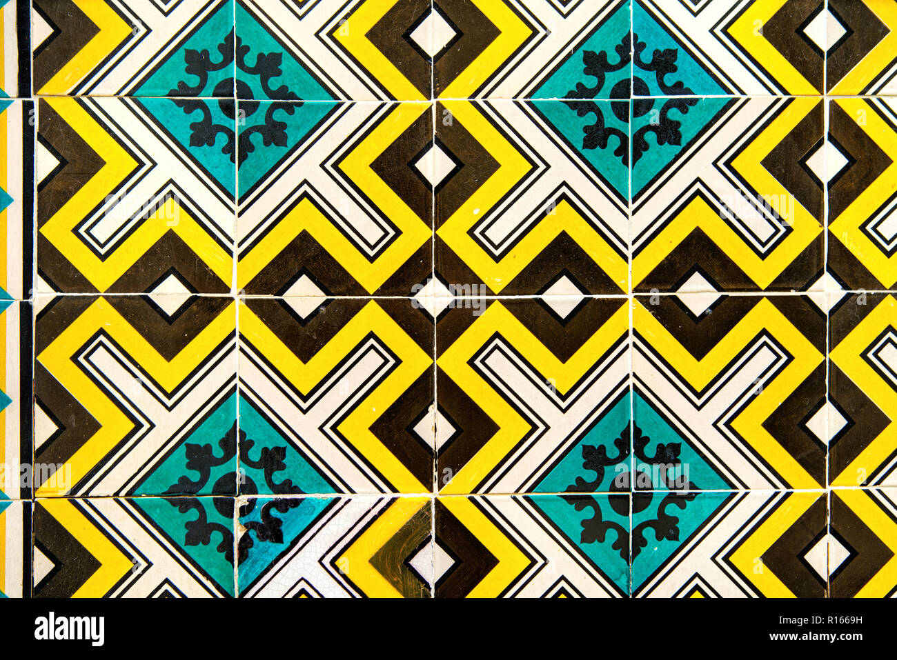 Detail of the traditional tiles from facade of old house Stock Photo ...