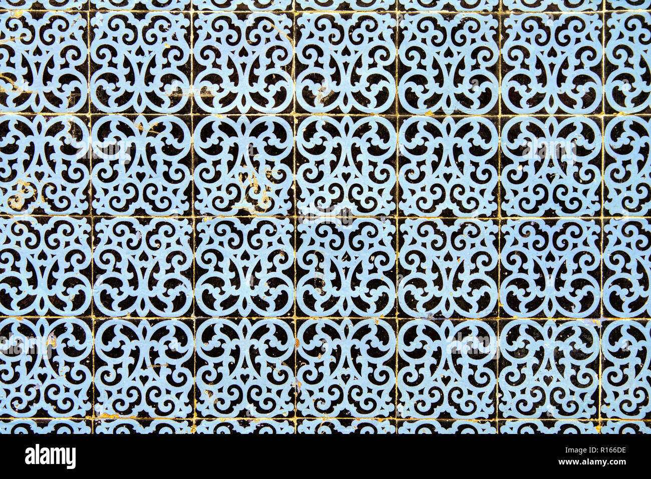 Detail of the traditional tiles from facade of old house Stock Photo ...