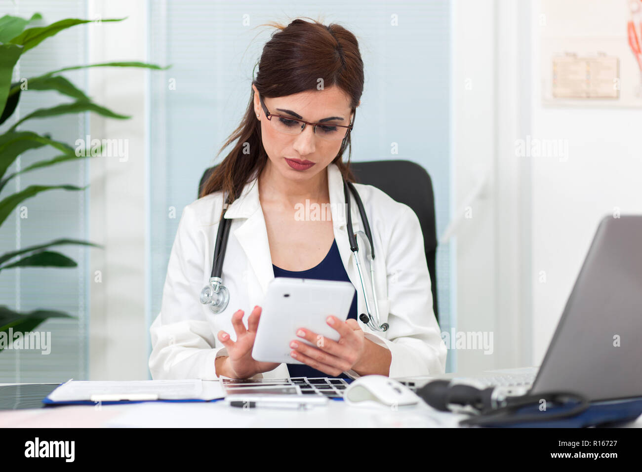 Beautiful female doctor in hi-res stock photography and images - Alamy