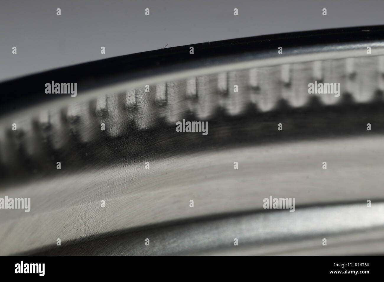 Inside rim of a single canning lid up close Stock Photo - Alamy