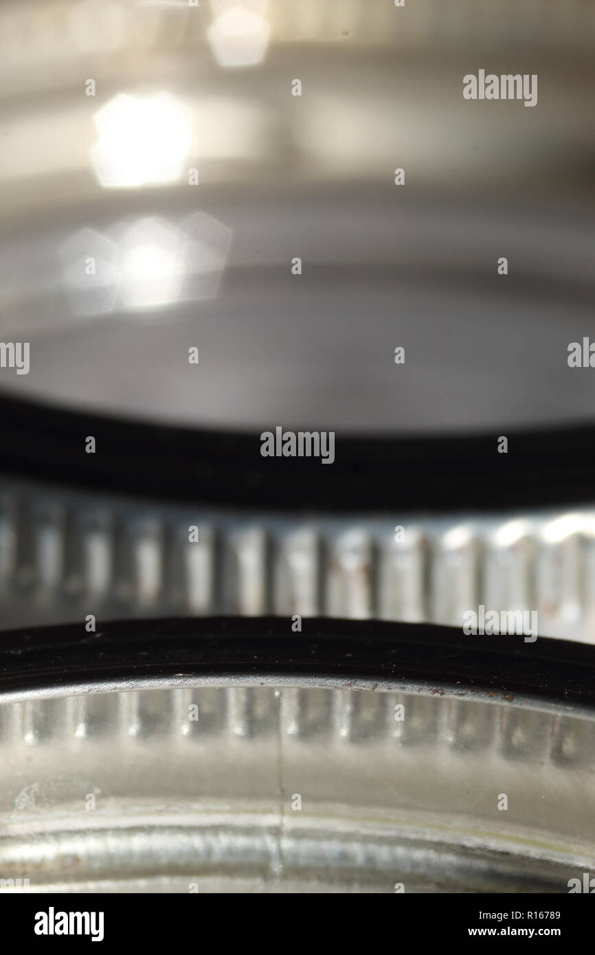 Two canning lids up close lined front to back and shot vertically Stock ...