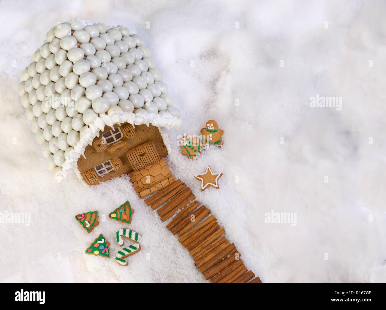 Cookie christmas tree and gingerbread house in a snow landscape Stock ...