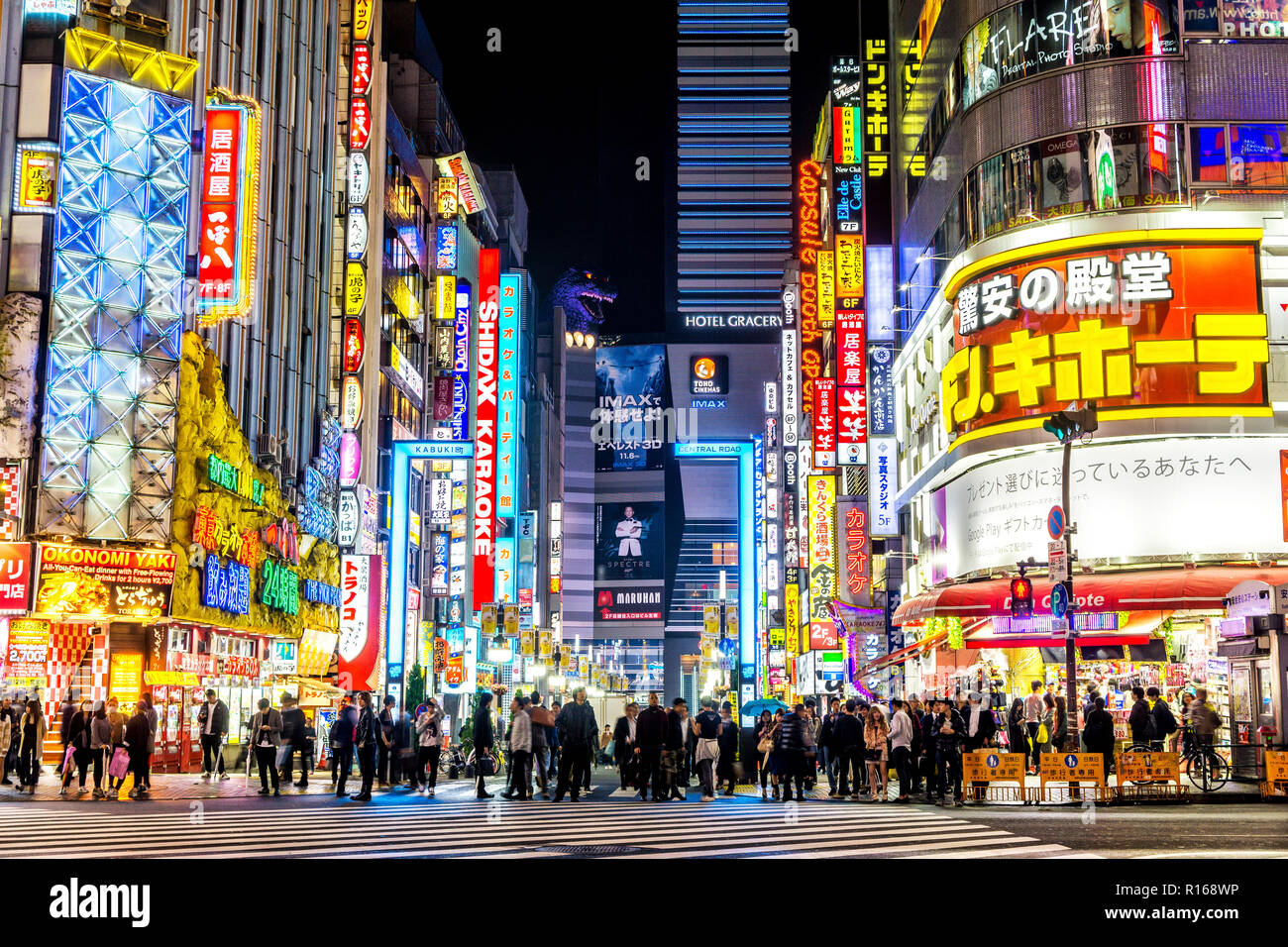 Neon signs Illuminate Tokyo’s busy Shinjuku neighborhood at night Stock ...