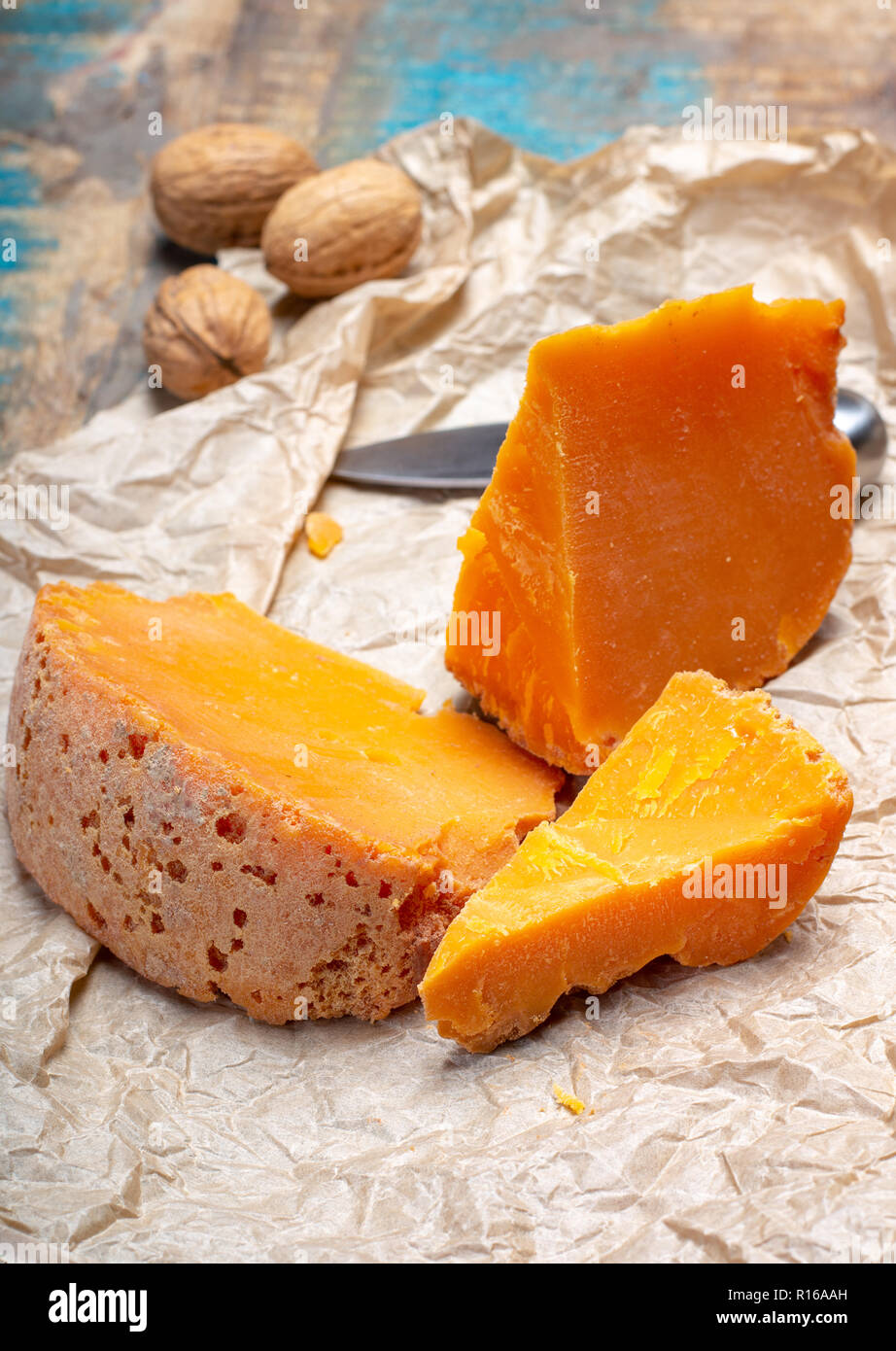 Pieces of native French aged cheese Mimolette, produced in Lille with ...