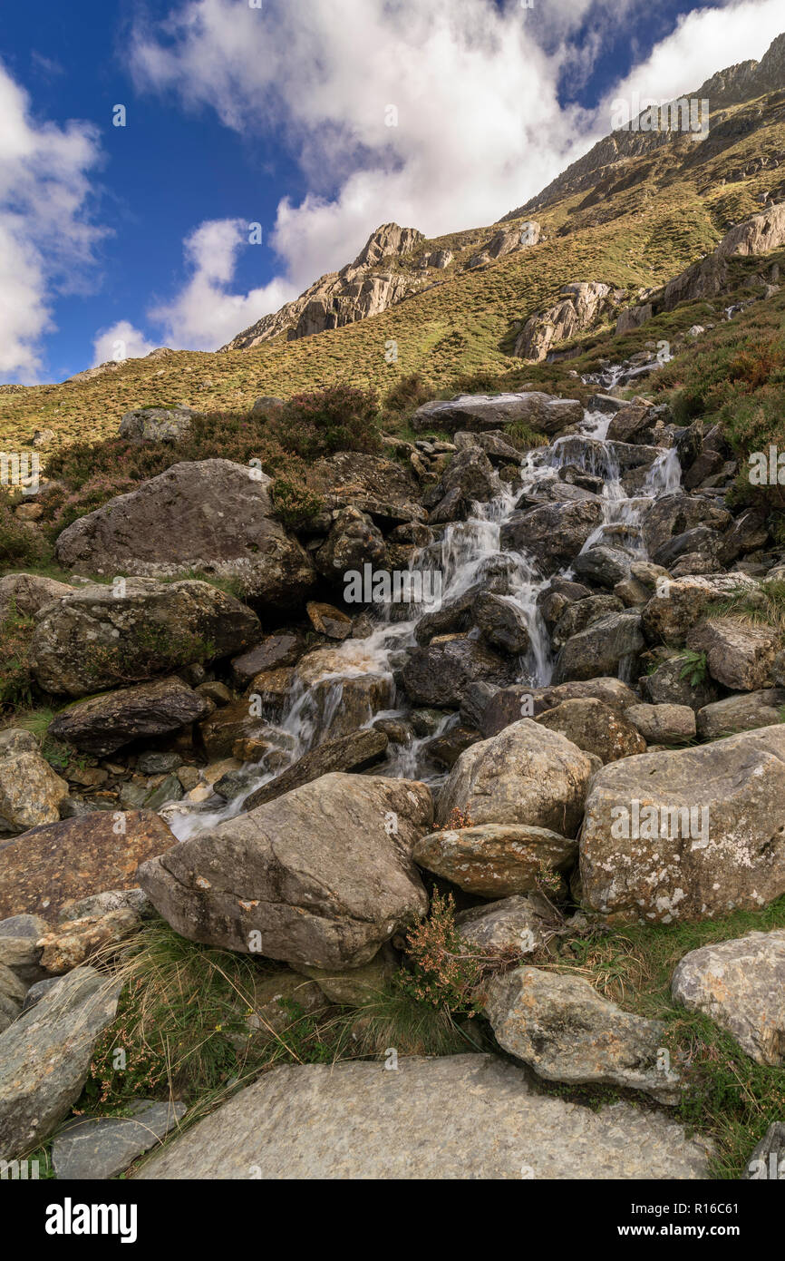 Mountain stream on the Cwm Idwal track in the Snowdonia National Park ...