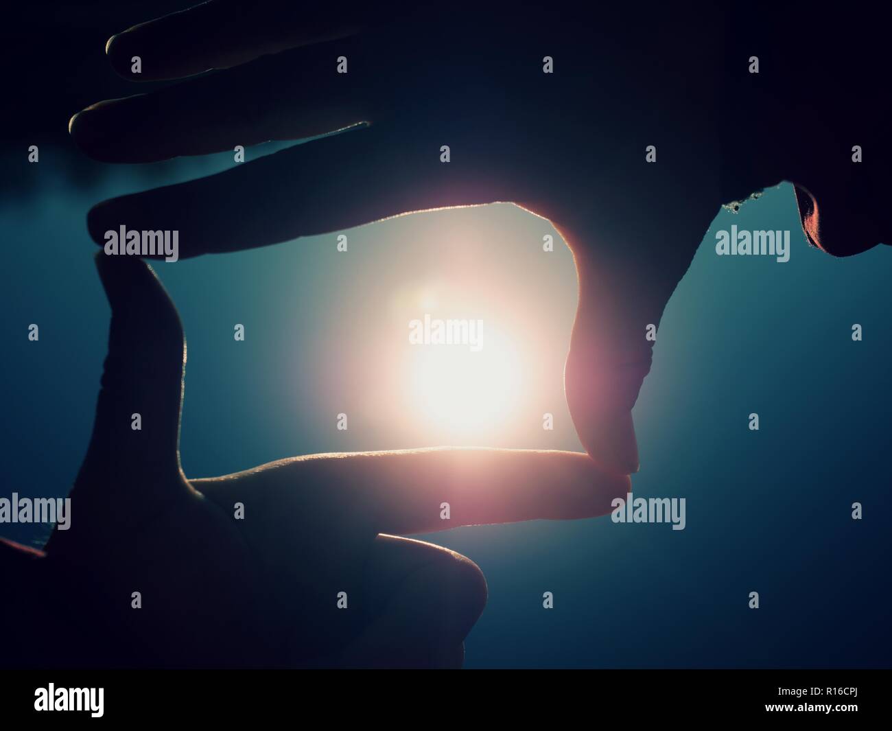 Couple hold hands sun flare hi-res stock photography and images - Alamy