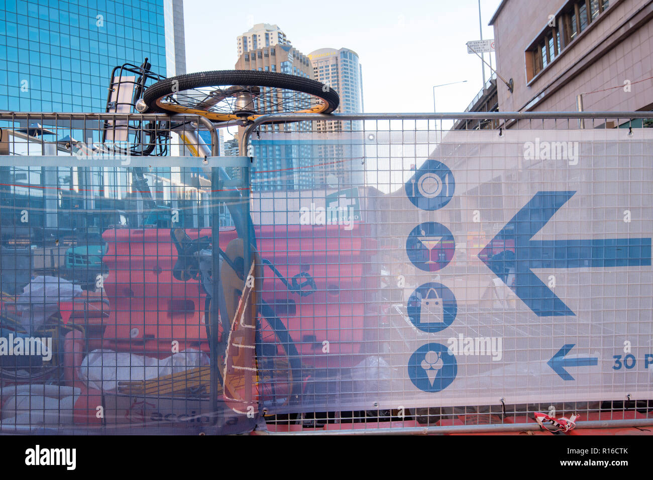 Safety fencing or hording fence around the Light Rail construction site ...