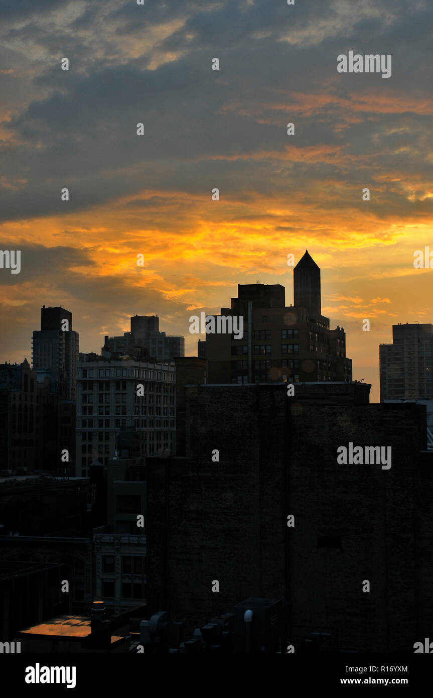 Manhattan skyline at sunset Stock Photo - Alamy