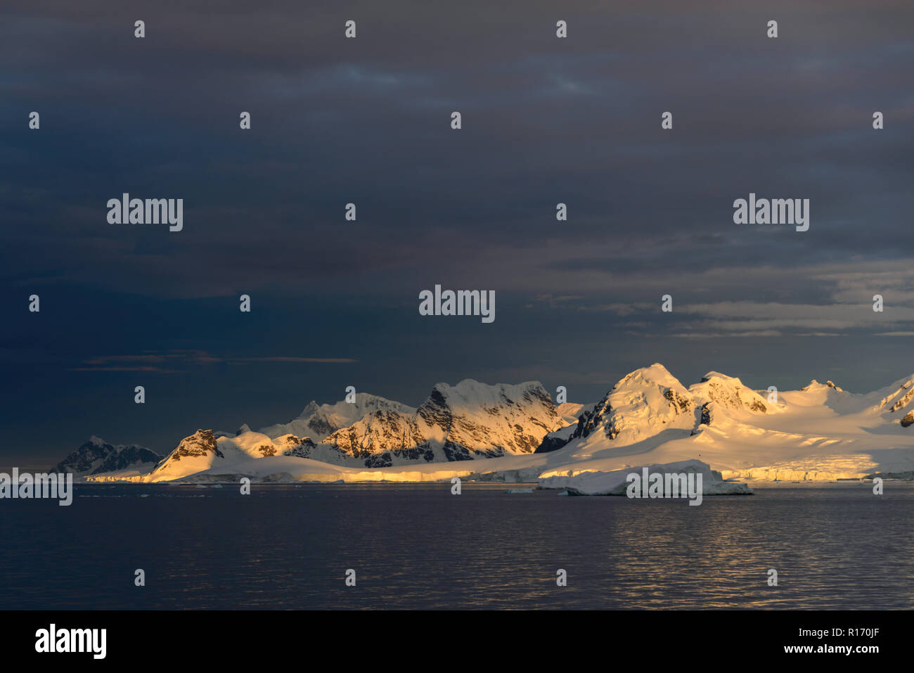 Landscape in Antarctica at sunset Stock Photo - Alamy