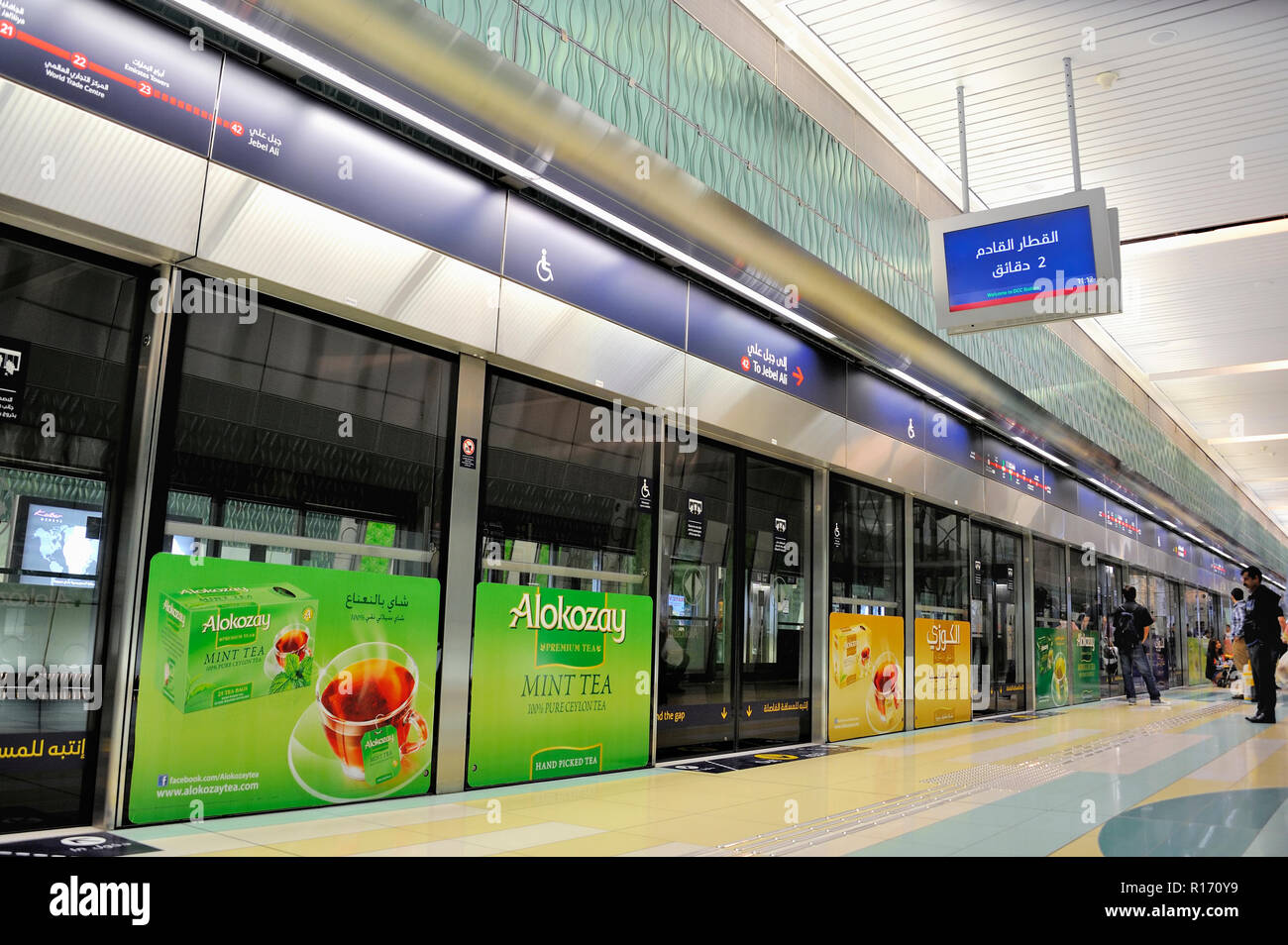 DUBAI,UAE-FEBRUARY 08,2014: Metro station Emirate Towers with signs in ...