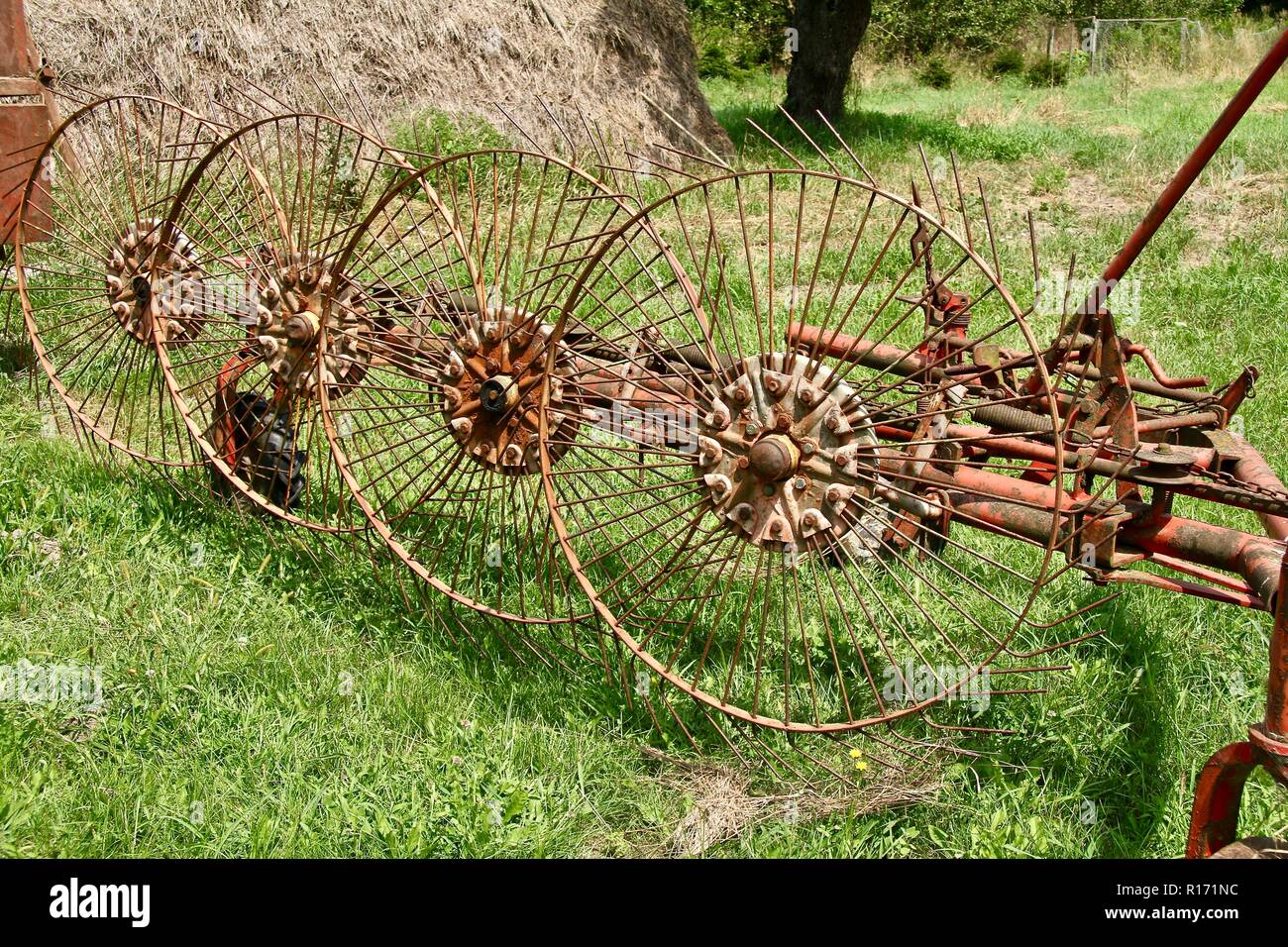 Rusty farm equipment on a farm on a sunny summers day Stock Photo - Alamy