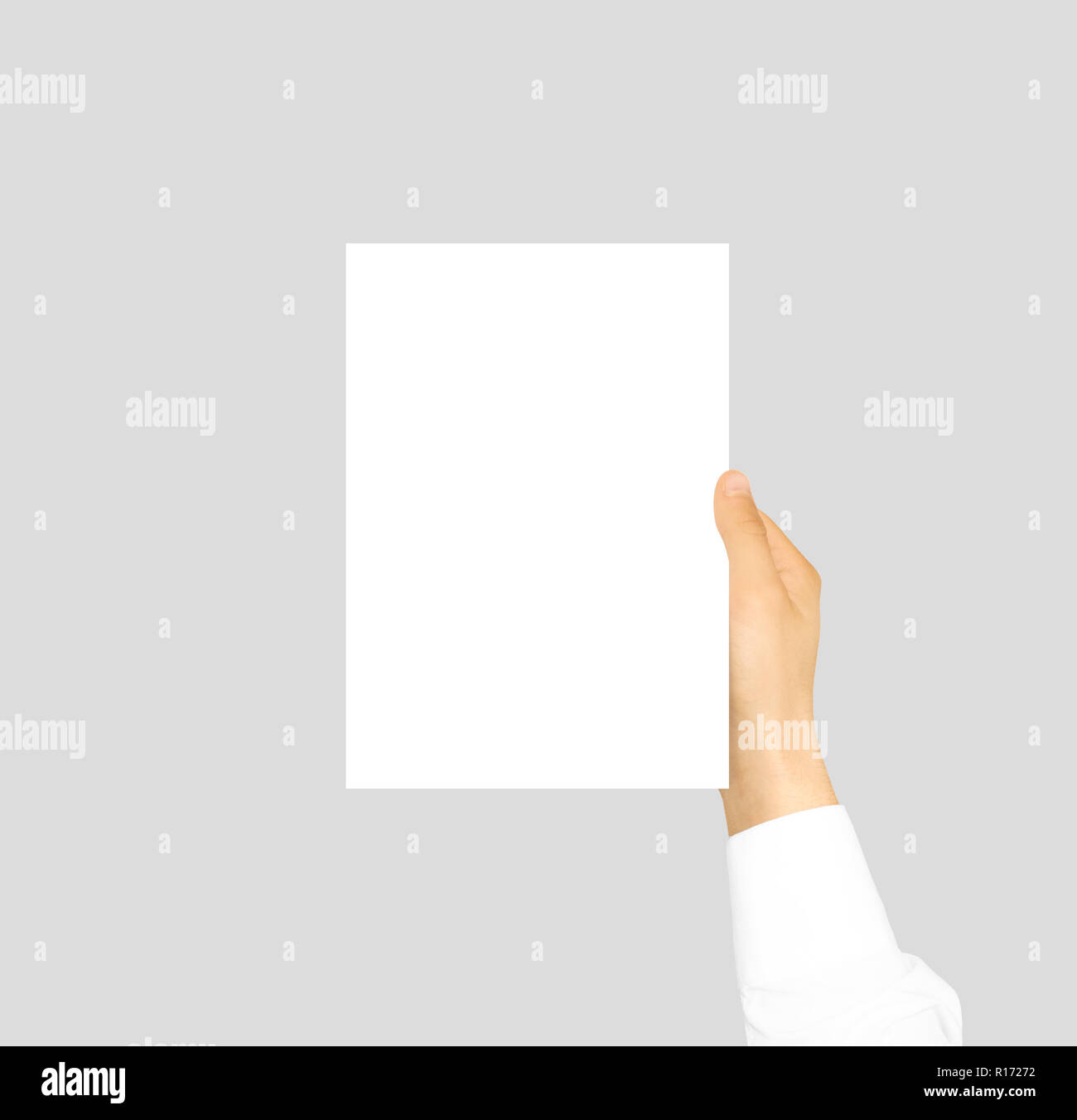 Hand holding blank flyer brochure booklet in the hand. Leaflet ...