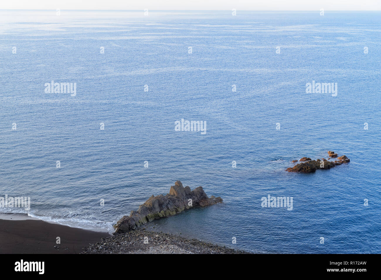 Blue water and the rocks on the Praia Formosa - famous public beach on ...