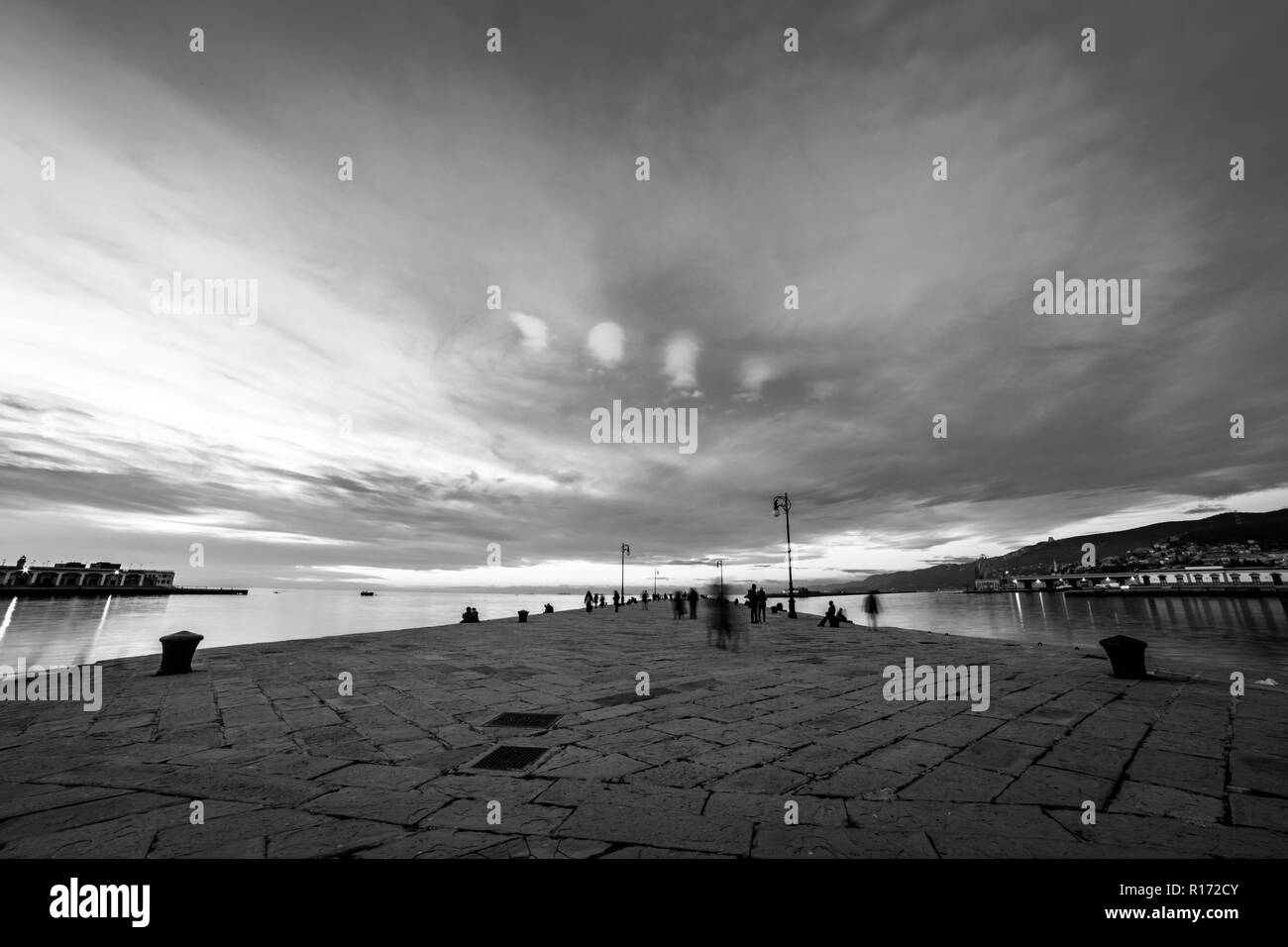 The Molo Audace pier of Trieste in a winter evening Stock Photo - Alamy