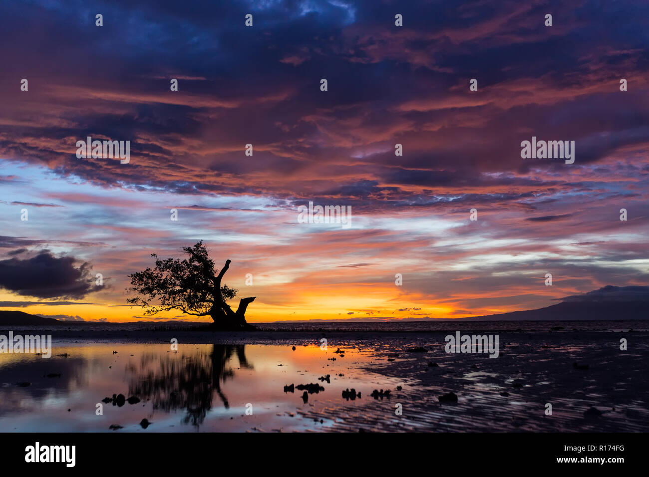Spectacular sunset in the Philippines on the island of Siquijor with a ...