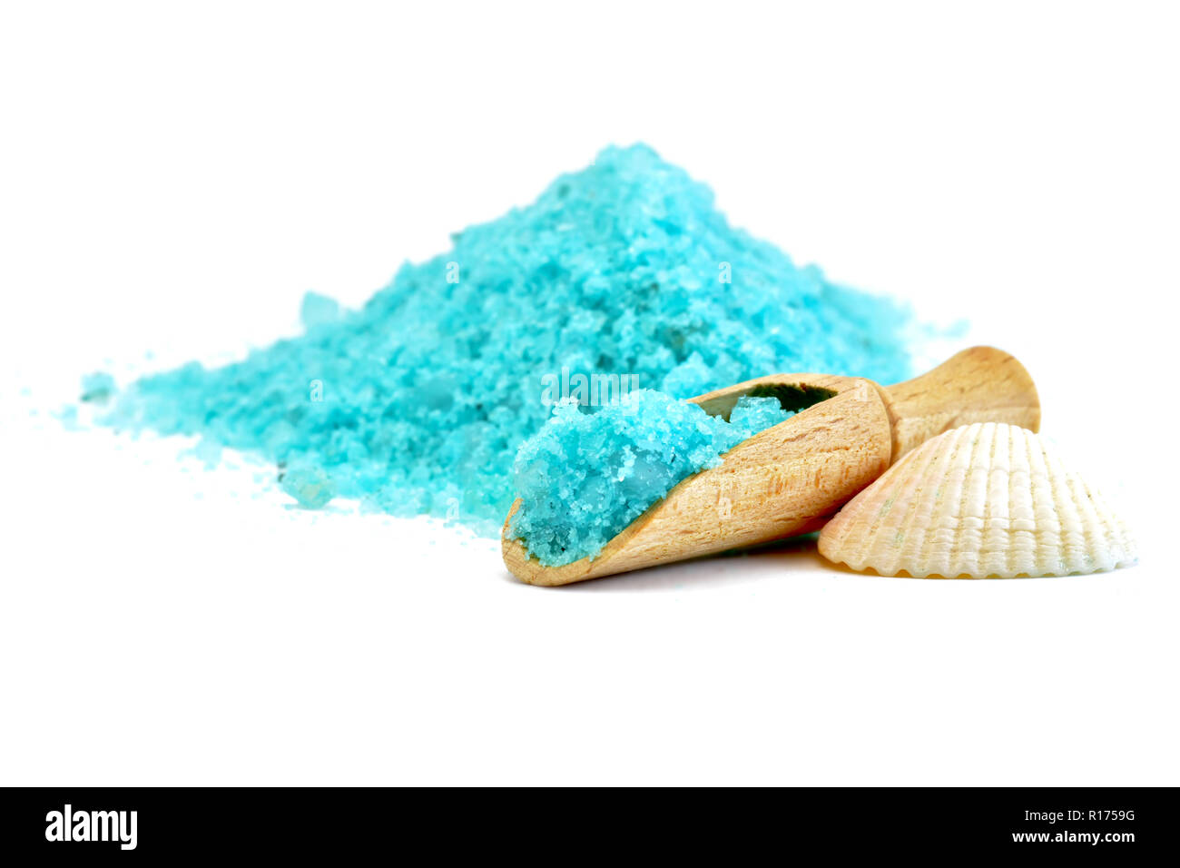 Blue sea salt with shells isolated on white background Stock Photo - Alamy