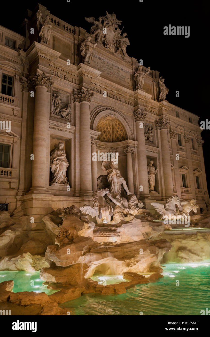Beautiful Trevi Fountain at night, with Ocean god and tritons statues ...