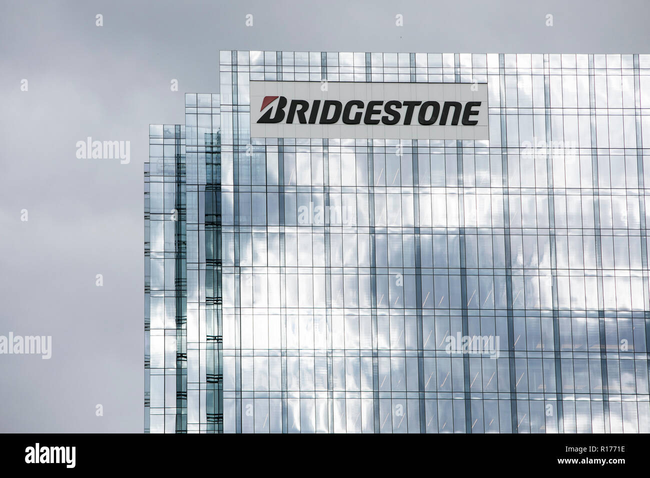 A logo sign outside of the headquarters of Bridgestone Americas in ...