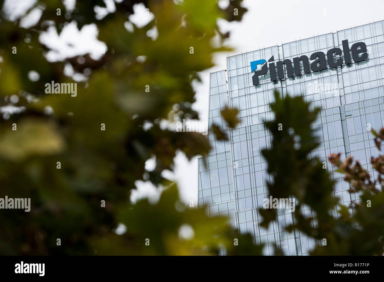 A logo sign outside of the headquarters of Pinnacle Financial Partners ...