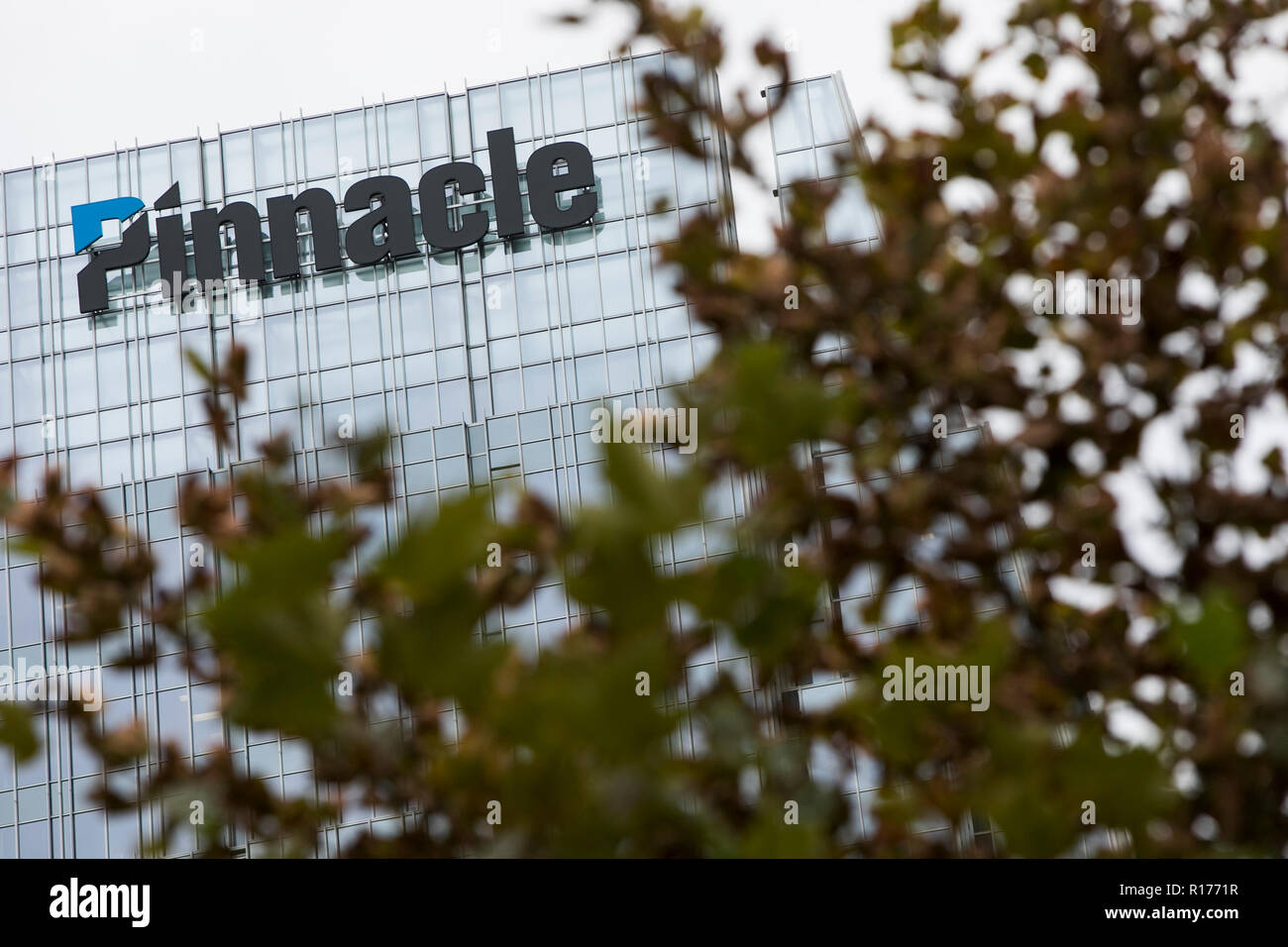 A logo sign outside of the headquarters of Pinnacle Financial Partners ...