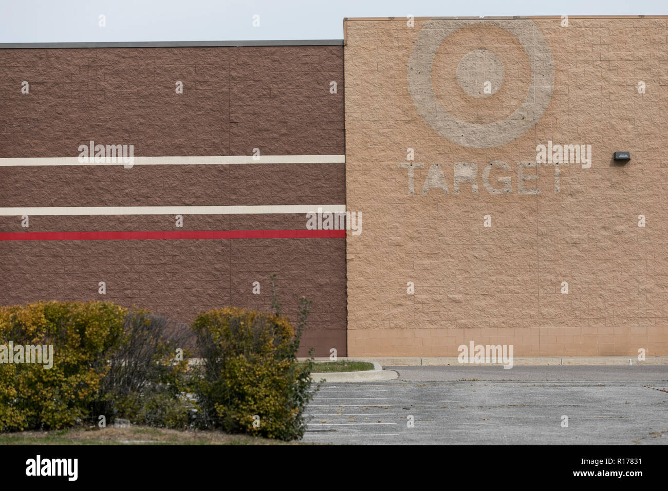 The faded outline of a logo sign outside of a closed Target Corporation ...