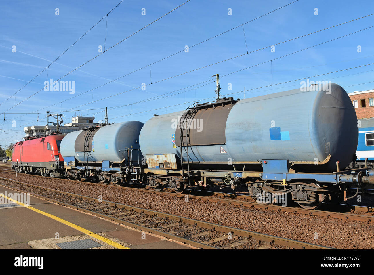 Freight train with oil transporter carriages Stock Photo - Alamy