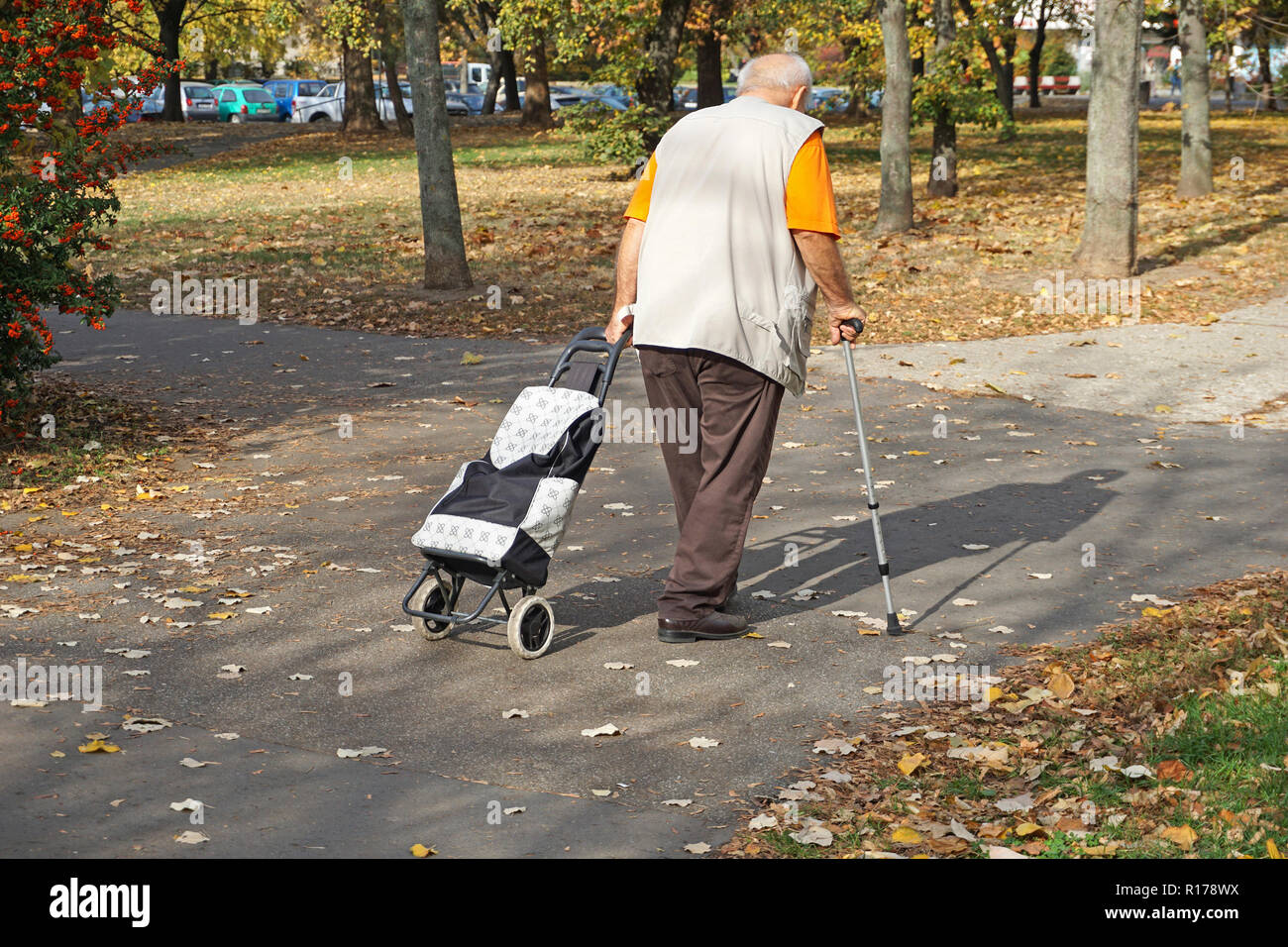 Man dragging bag hi-res stock photography and images - Alamy