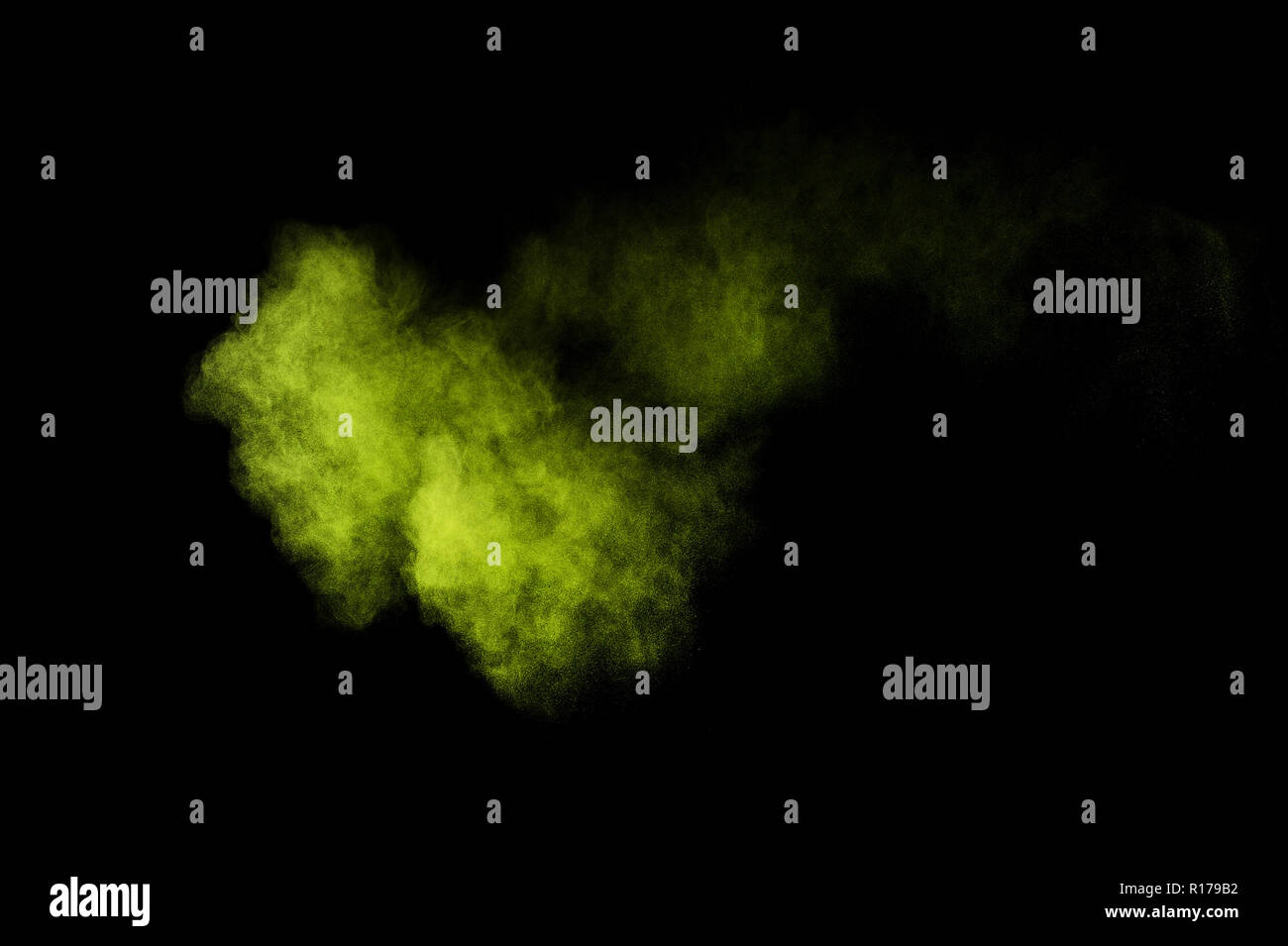 Light green powder explosion on black background. Colored powder cloud ...