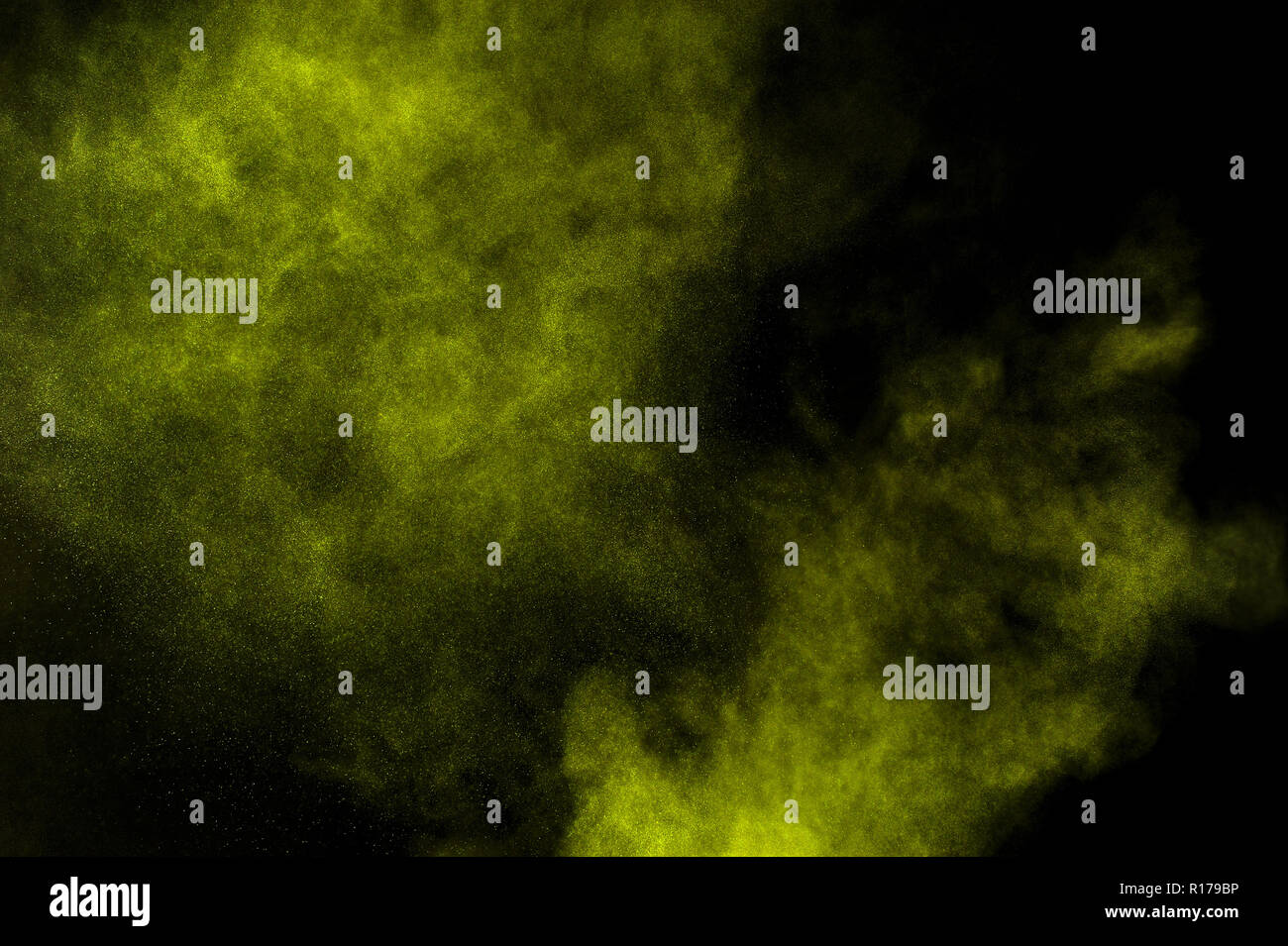 Light green powder explosion on black background. Colored powder cloud ...