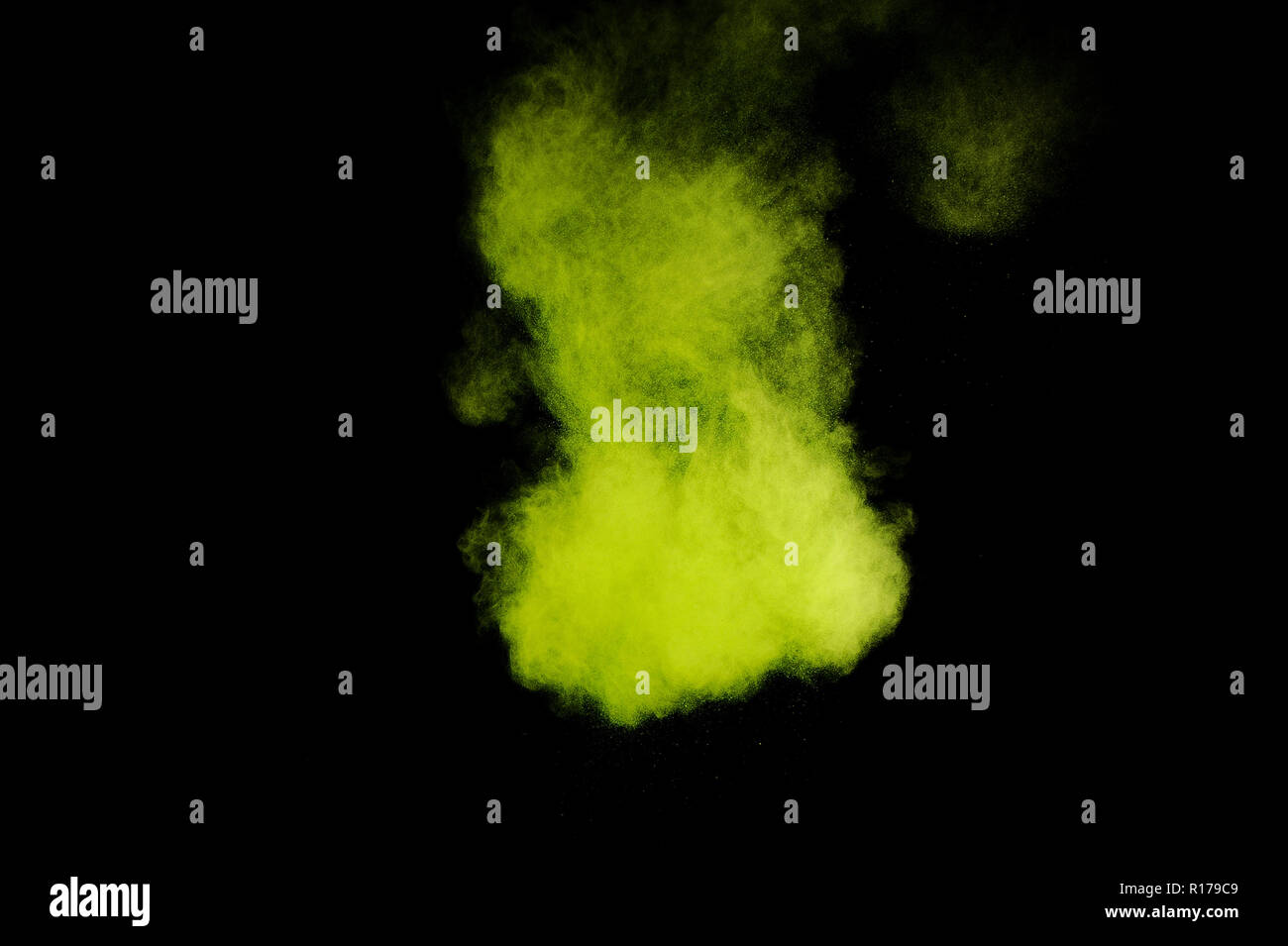 Light green powder explosion on black background. Colored powder cloud ...