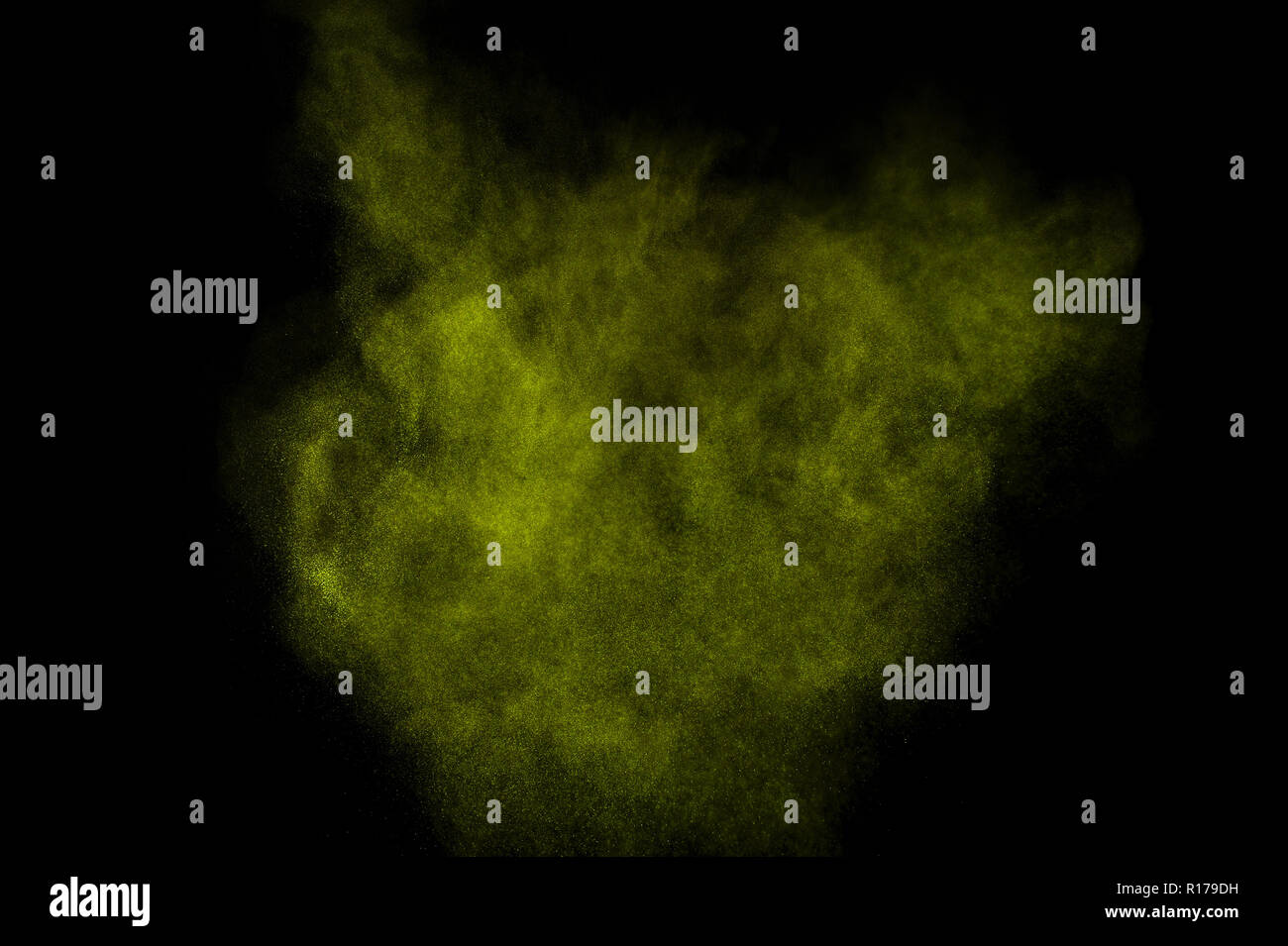 Light green powder explosion on black background. Colored powder cloud ...