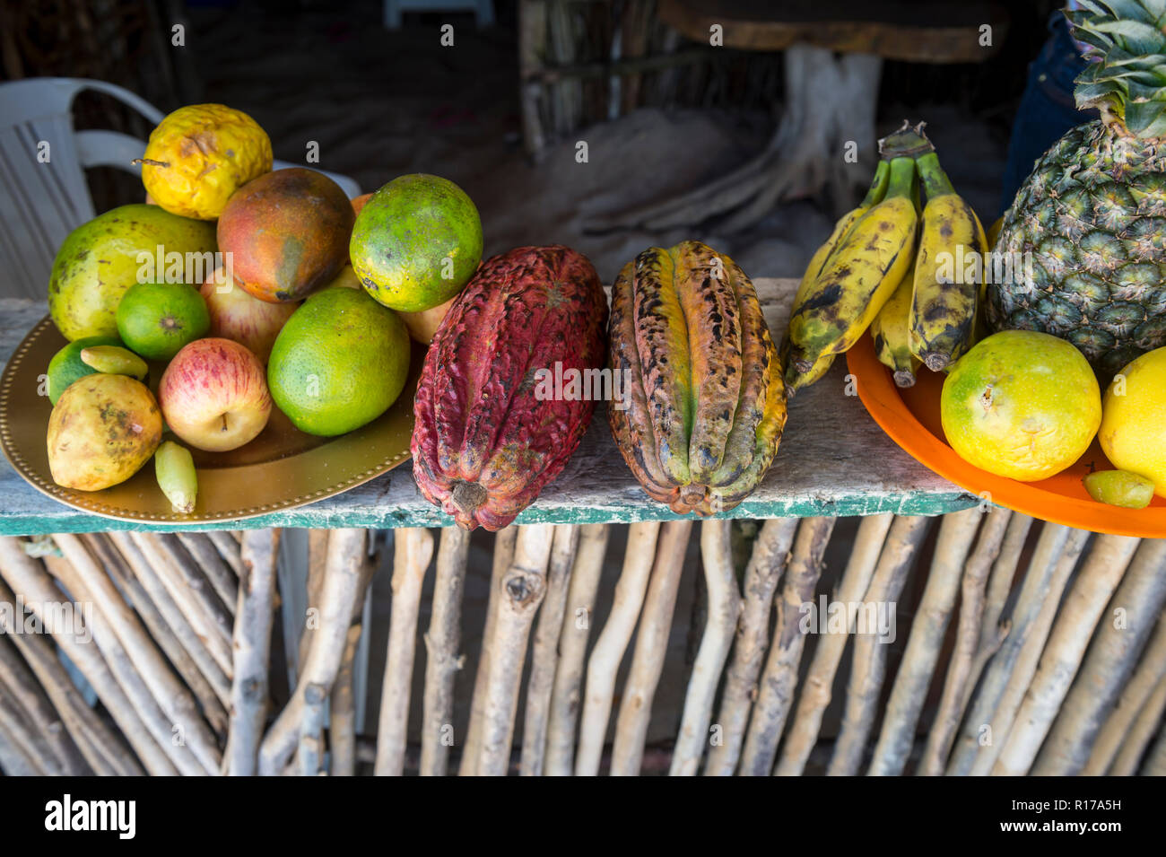 Rustic Brazilian beach bar lined with fresh local tropical fruits for ...