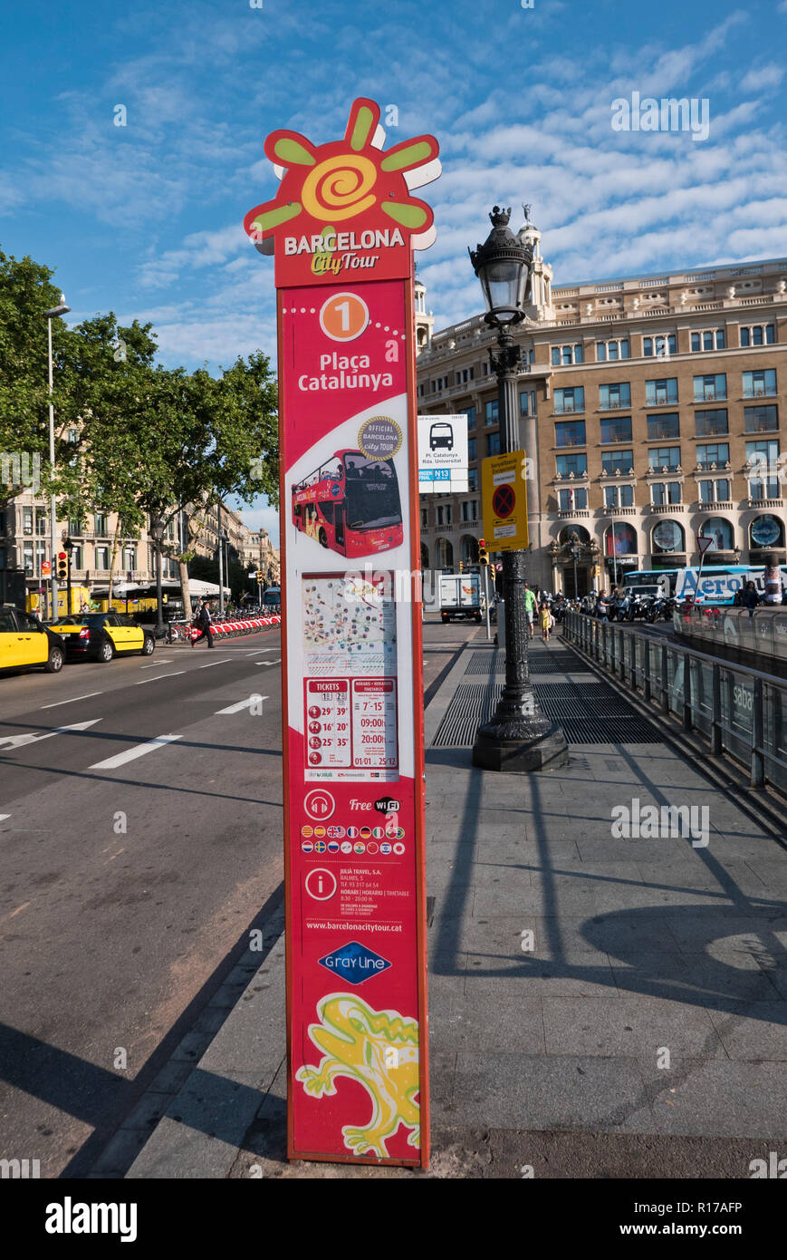 A bus signpost for the Barcelona City Tour in Placa Catalunya ...
