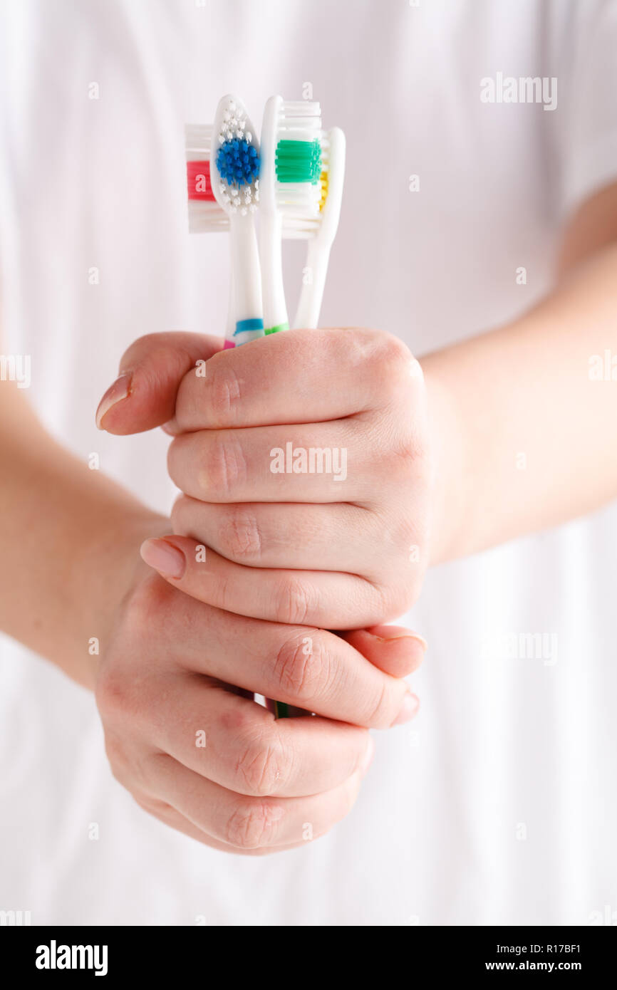 toothbrush with hand Stock Photo - Alamy