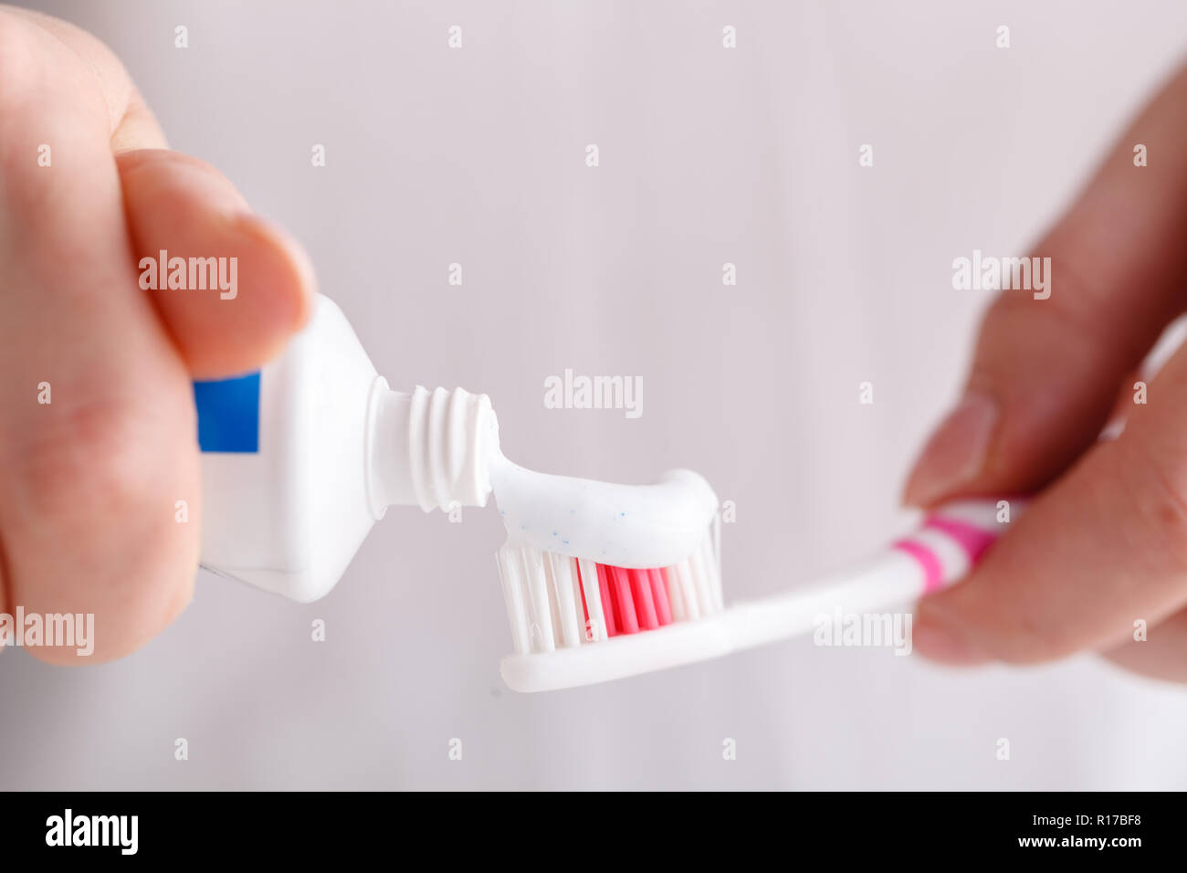 Squeezing toothpaste tube hi-res stock photography and images - Alamy