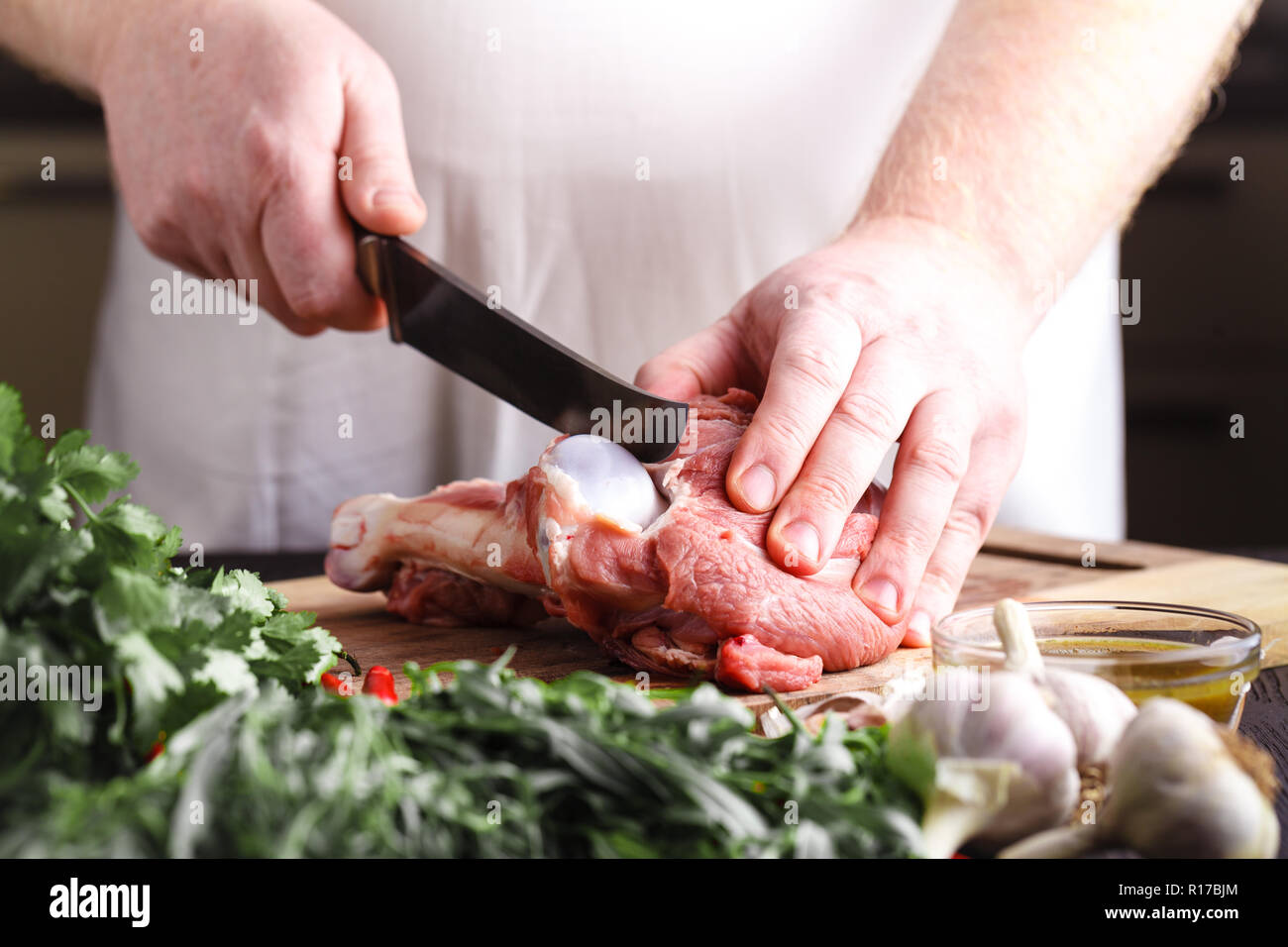 Cutting raw meet hi-res stock photography and images - Alamy