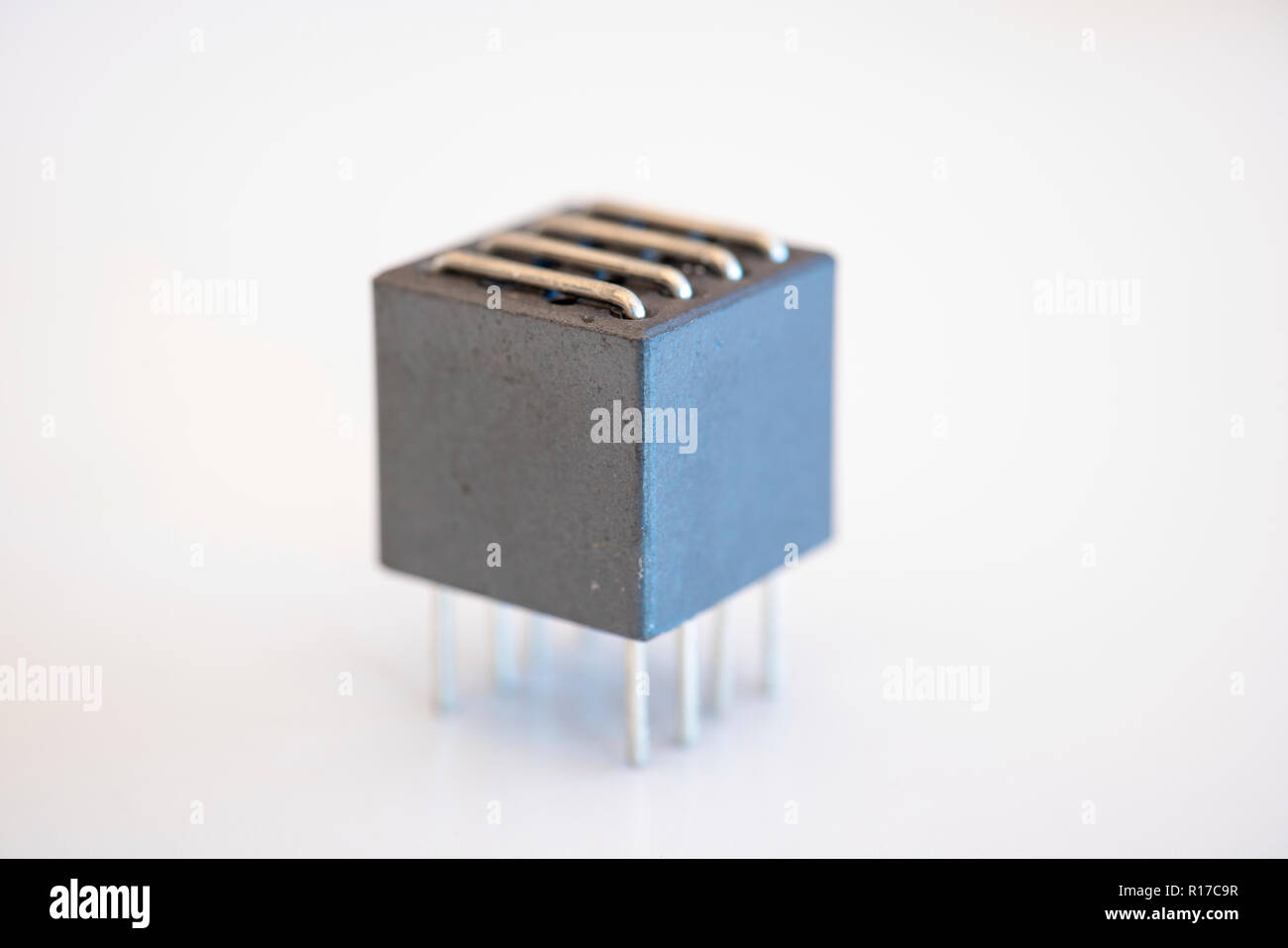 Electronic transformer isolated on white background Stock Photo - Alamy