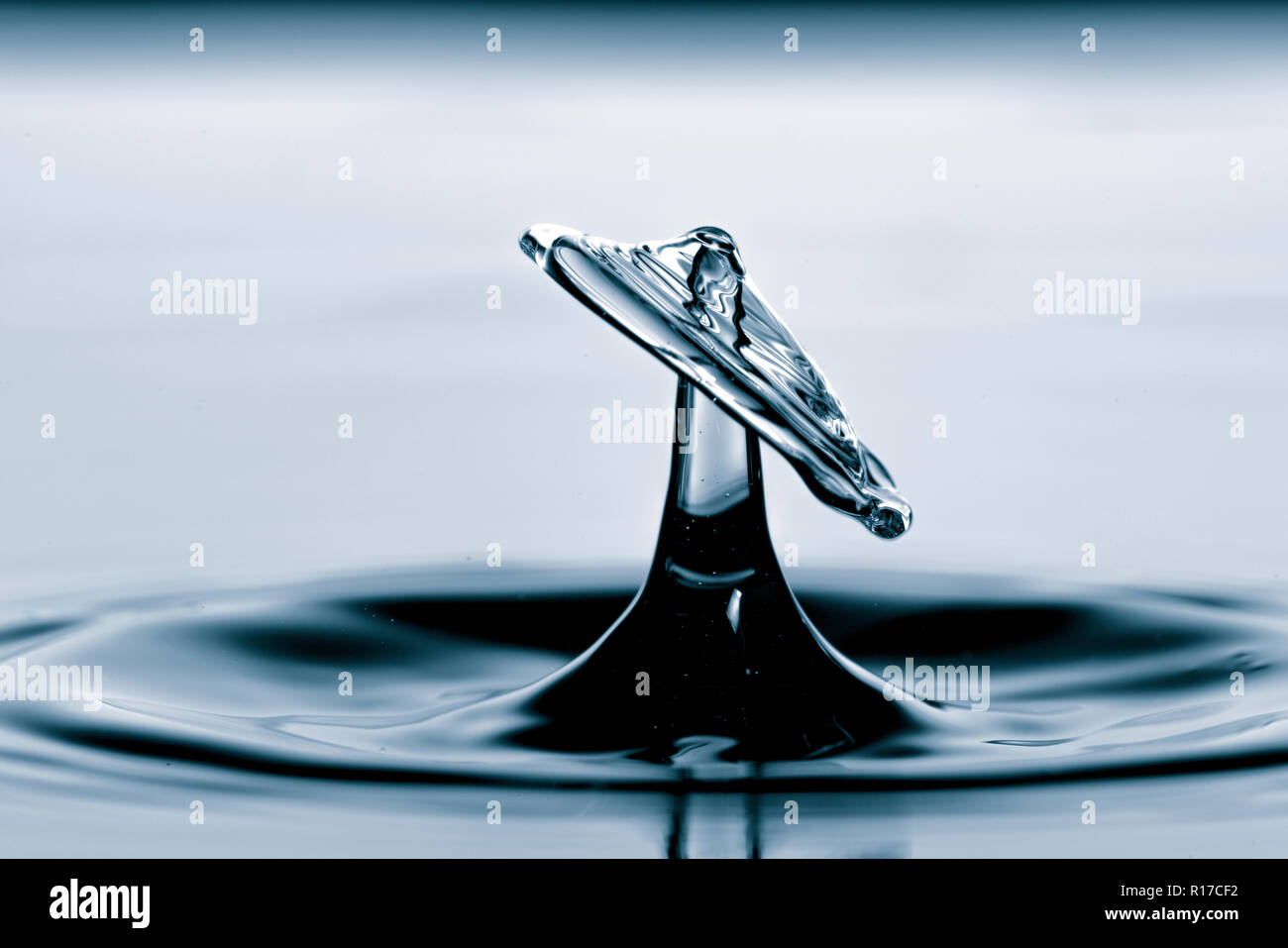 Water drop impact Stock Photo - Alamy