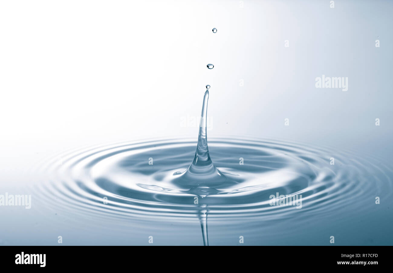Water drop impact Stock Photo - Alamy