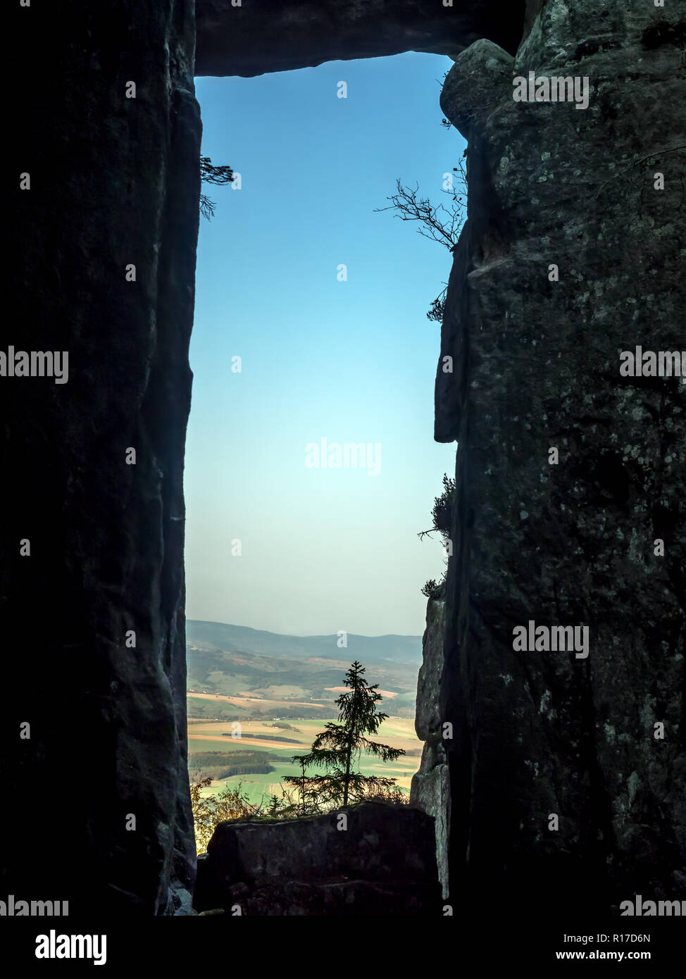 The so called Devil's Kitchen of Szczeliniec - a deep rock chasm - in ...