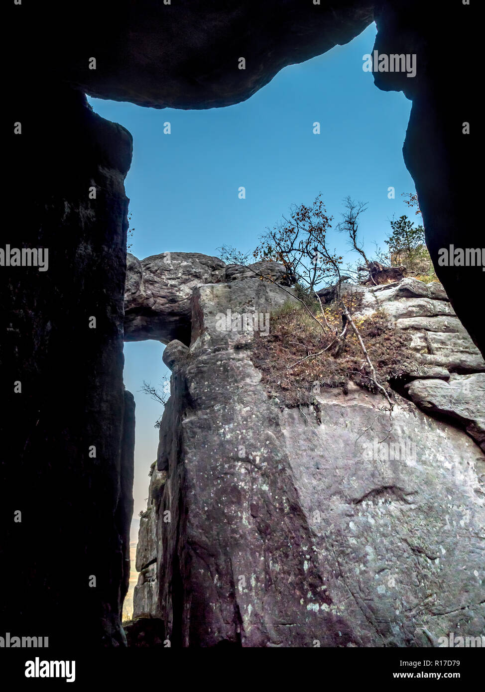 The so called Devil's Kitchen of Szczeliniec - a deep rock chasm - in ...